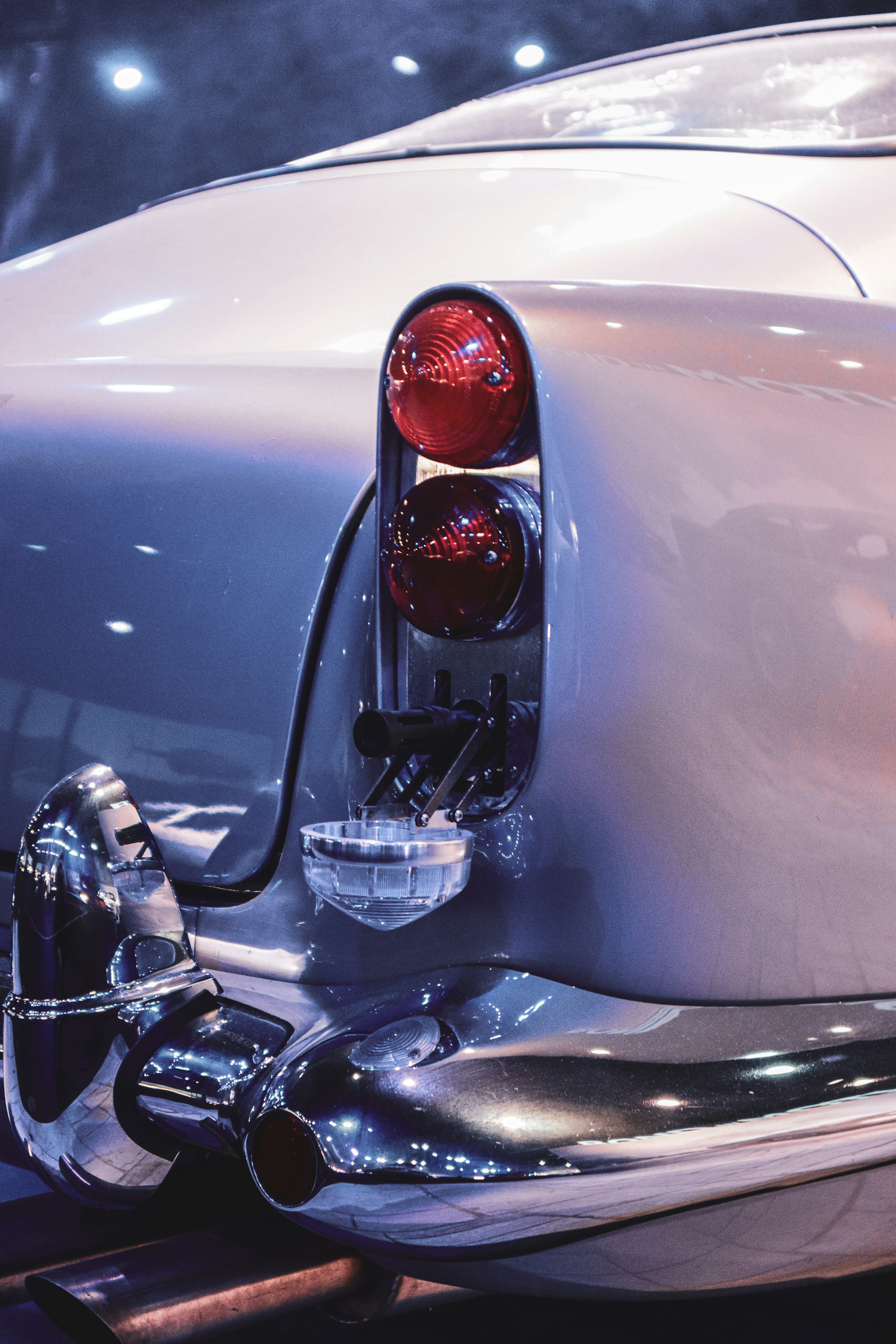 Chrome Contours and Quiet Illumination: A Vintage Tail Light Portrait