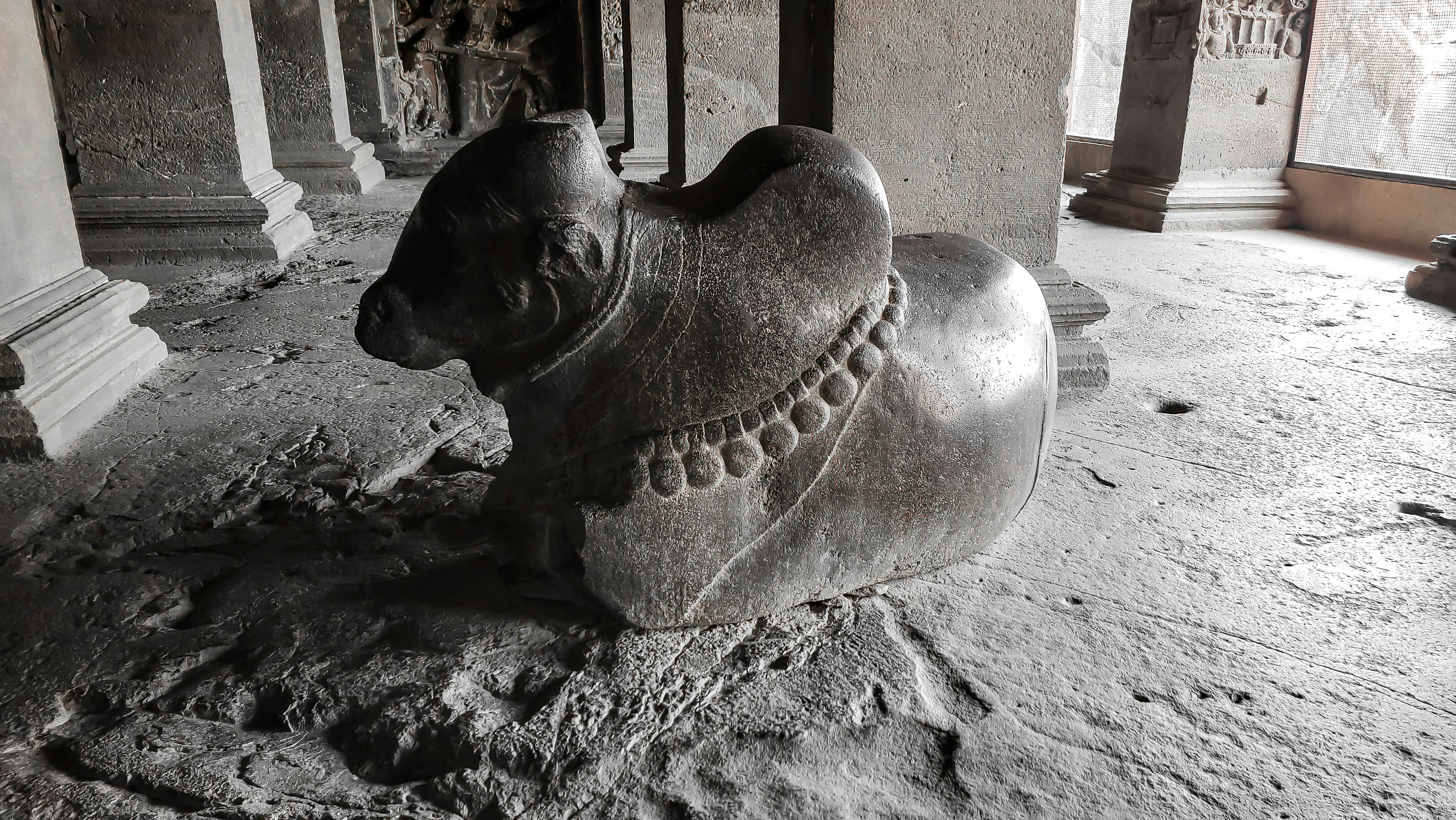 Stone guardian in the temple ruins