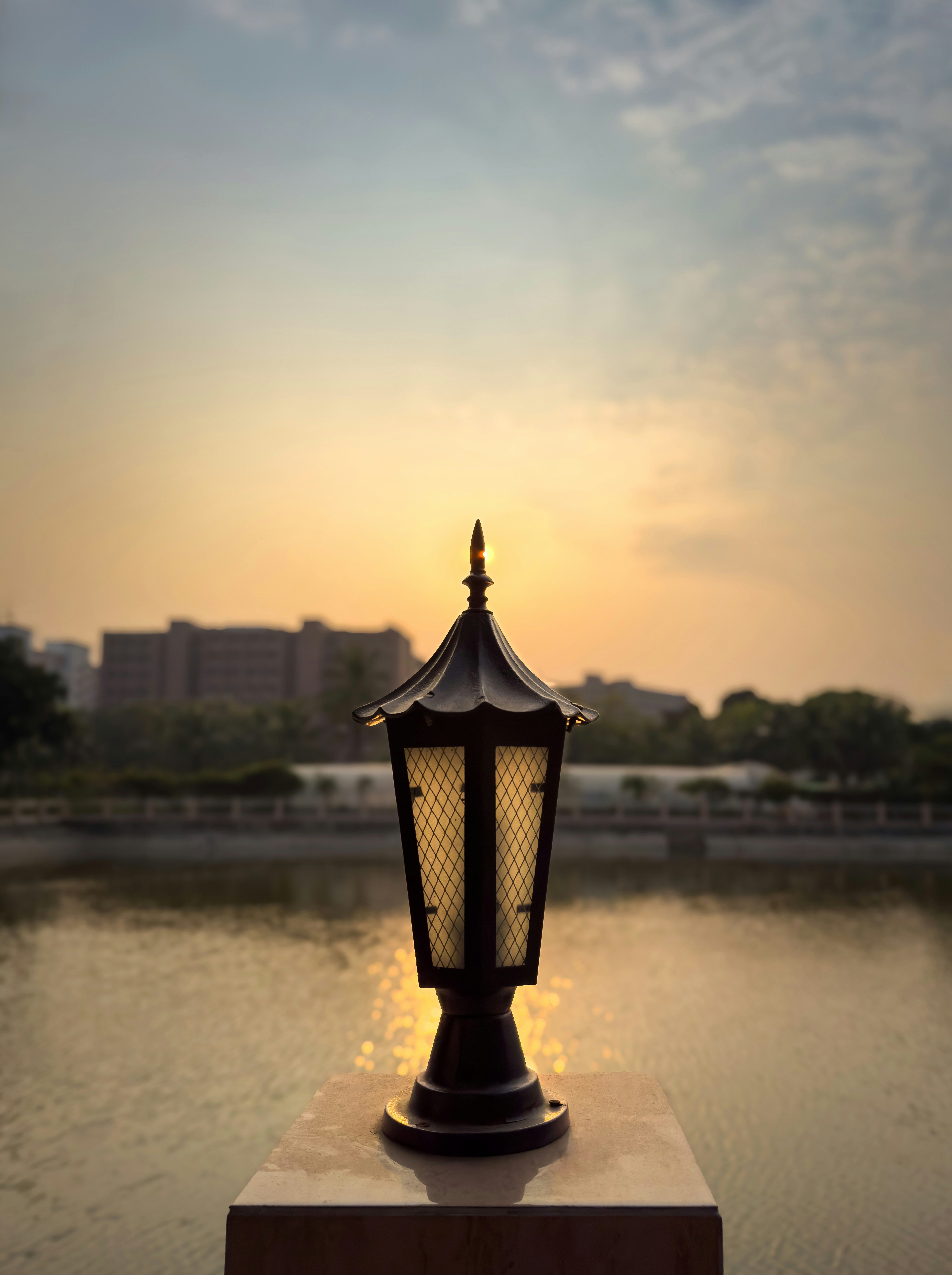 A lamp post sitting on top of a lake photo – Free Outdoors Image on ...