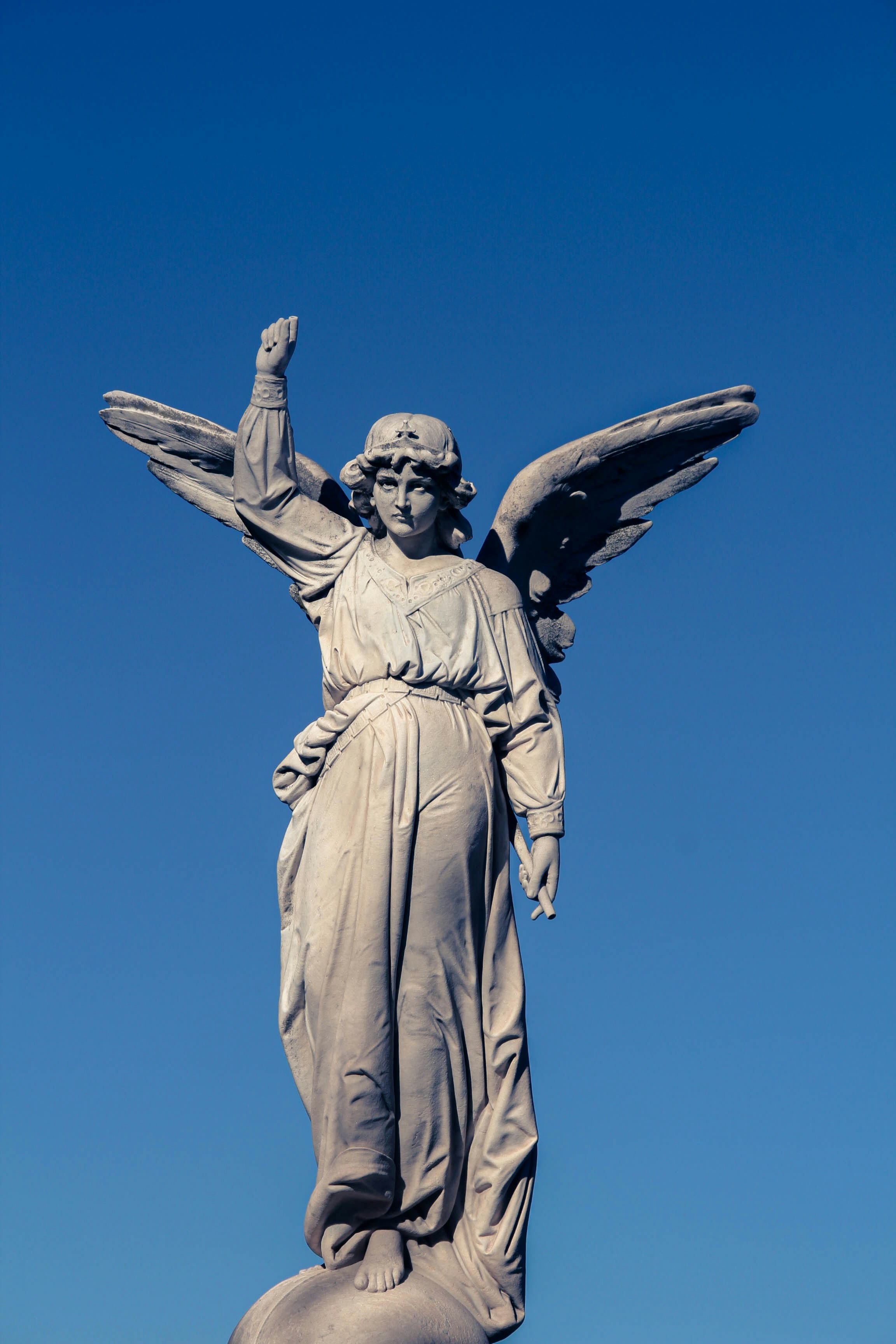 A statue of an angel on top of a building photo – Free Art Image on ...