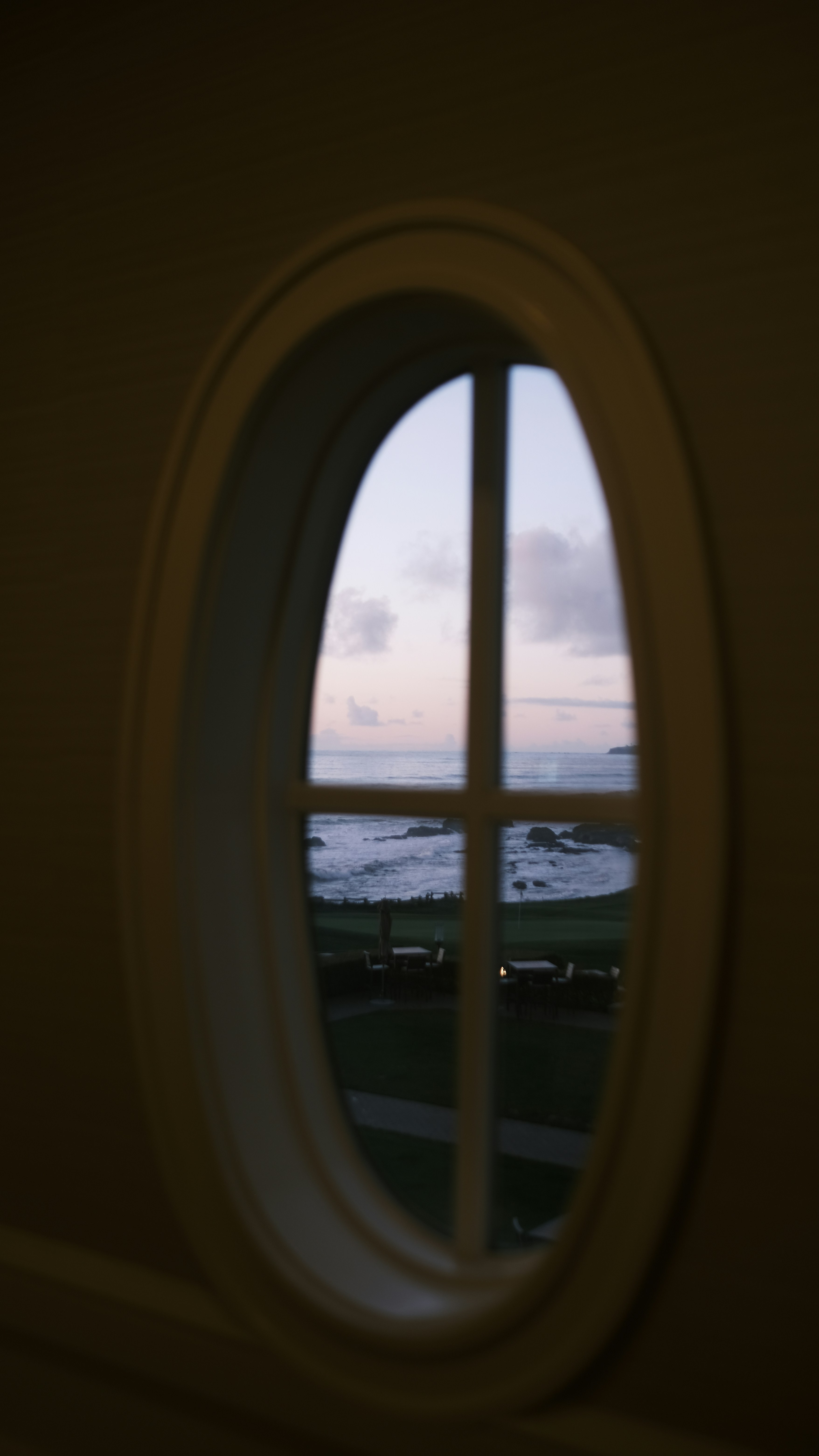 Oval Window, Quiet Sea at Dusk