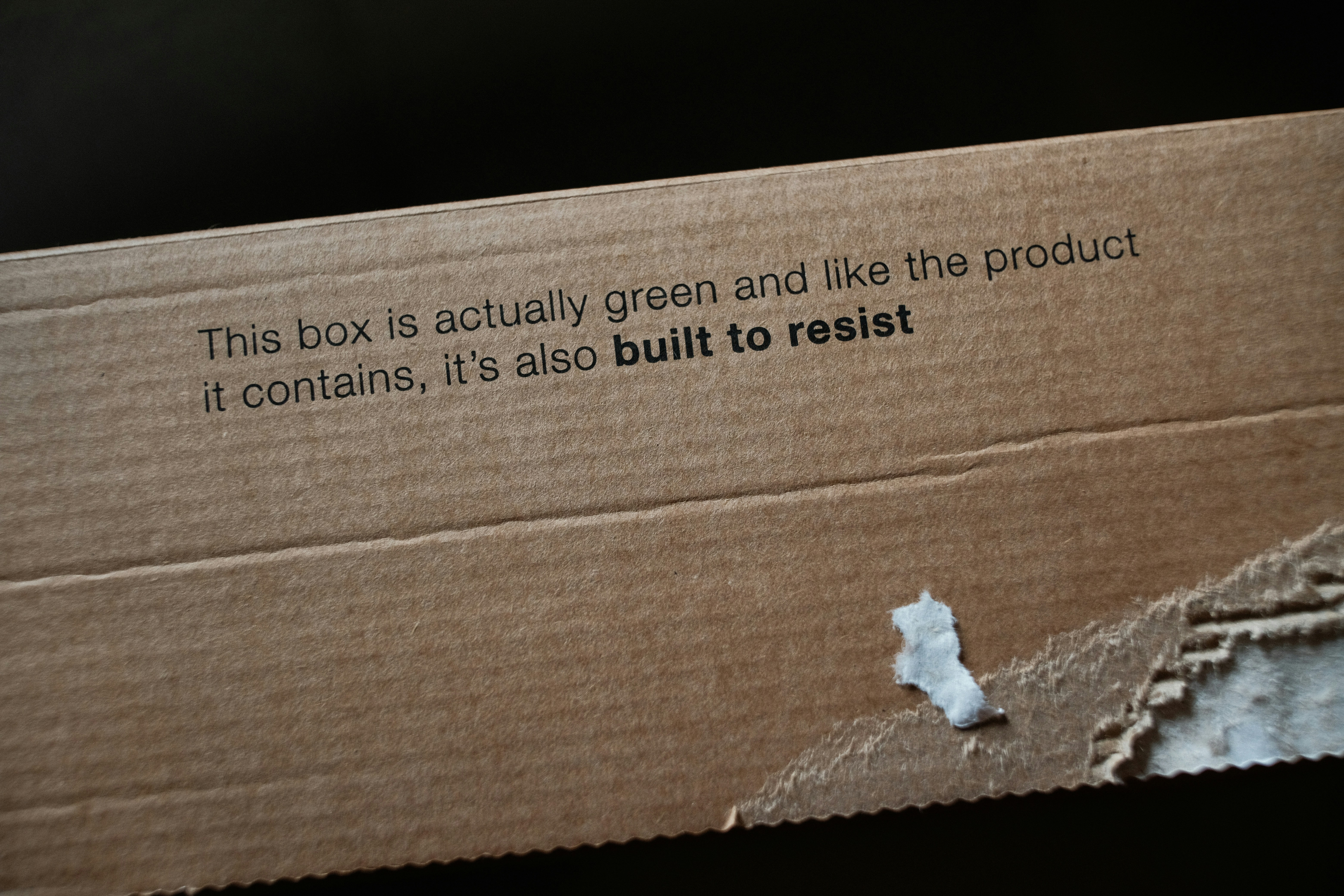 A cardboard box with a message on it photo – Free Grey Image on Unsplash