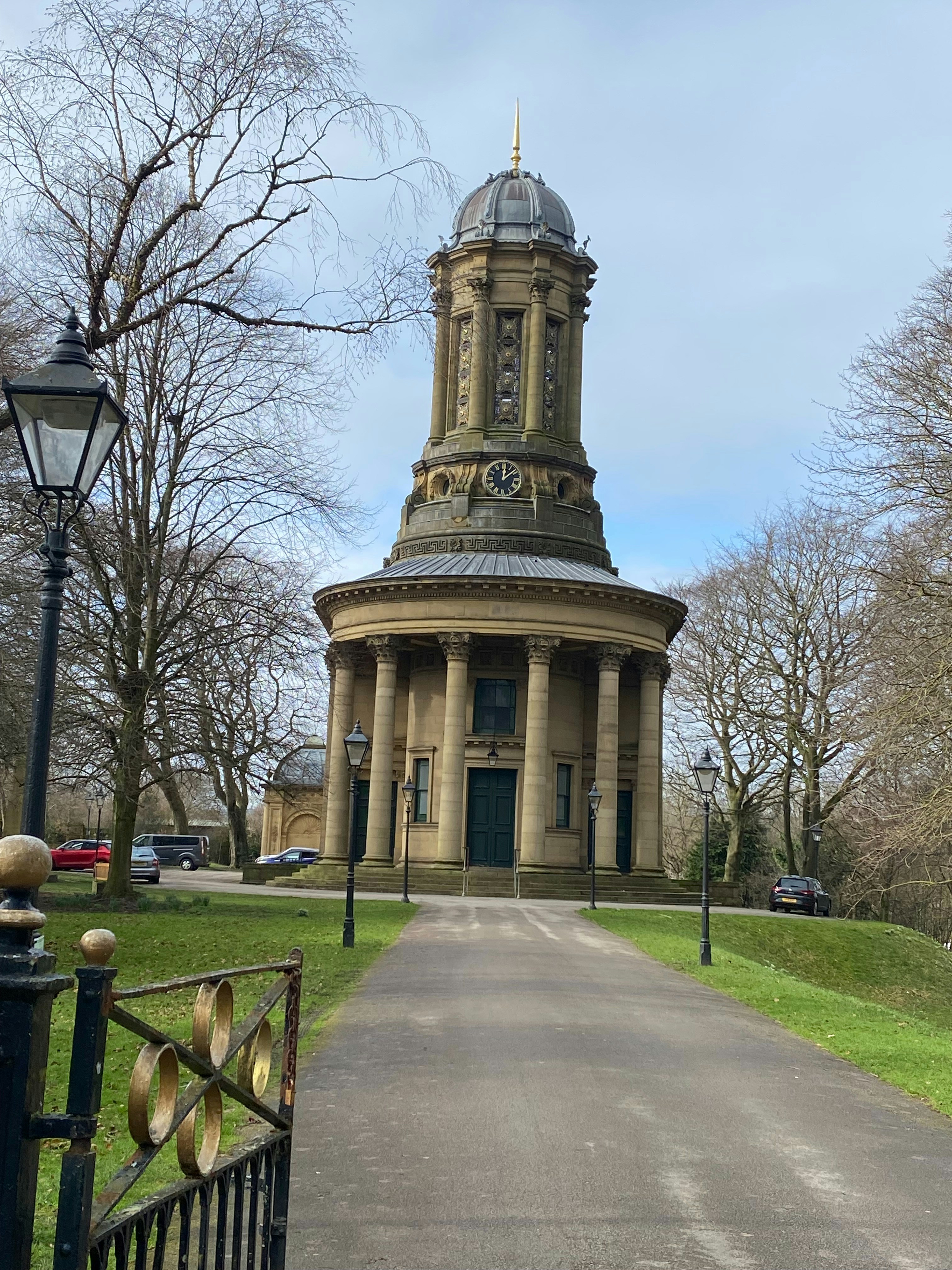 A large building with a clock tower on top of it photo – Free Car Image ...