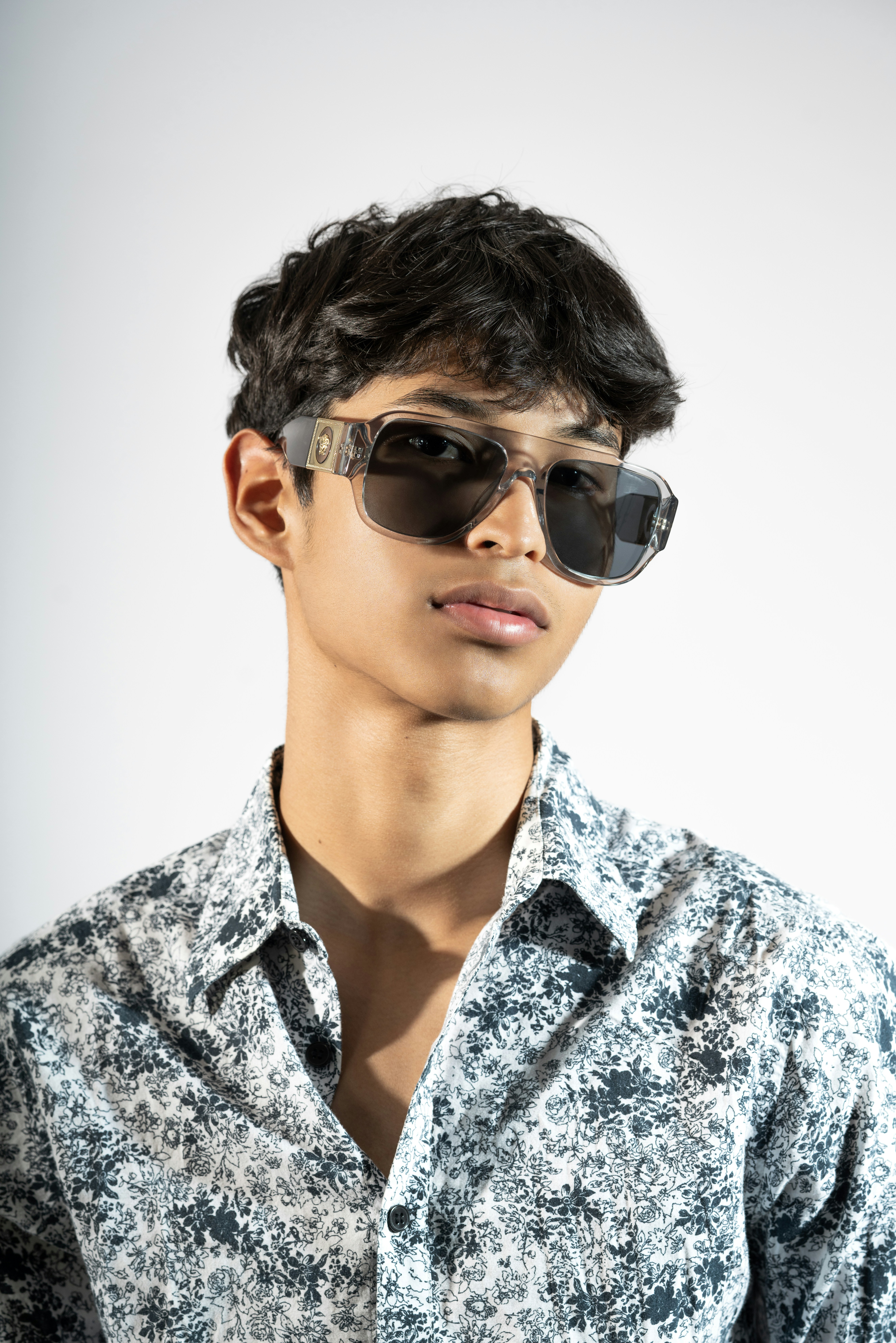 Floral Echo: Studio Portrait with Oversized Sunglasses