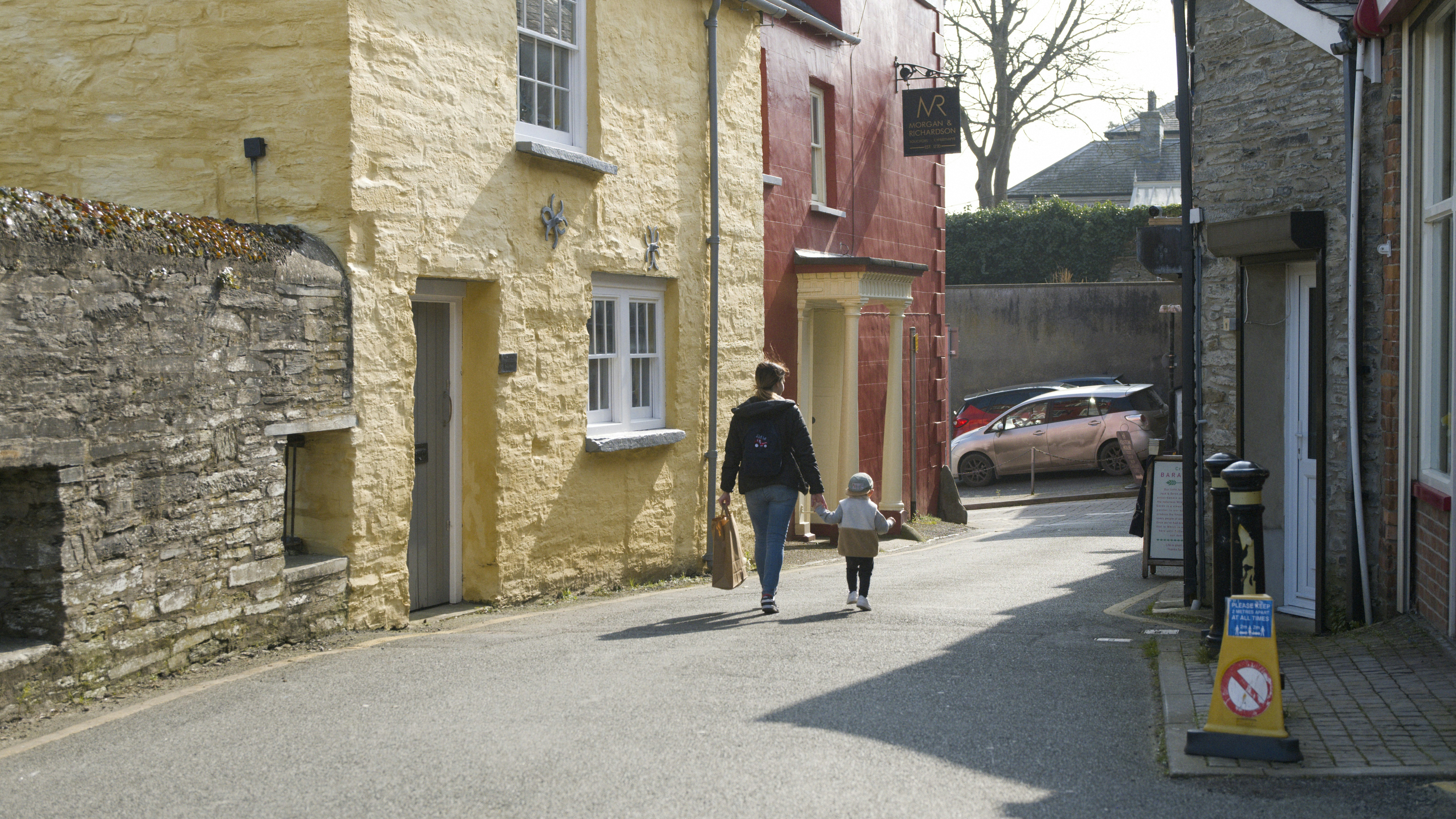 Footsteps on a Sunlit Village Lane