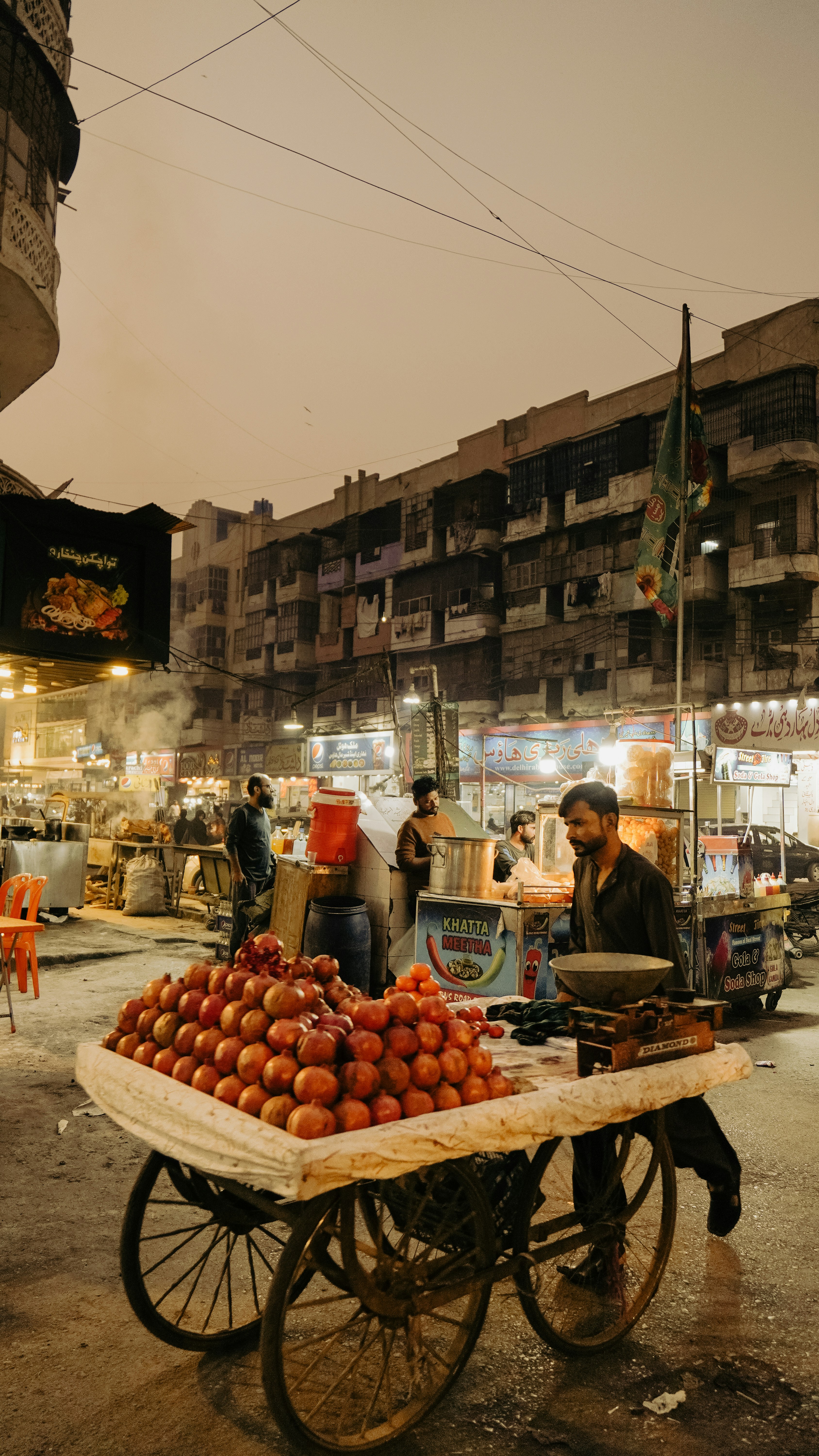 Copper Twilight Market: Tomatoes, Steam, and Neon in a Noisy Street Stall