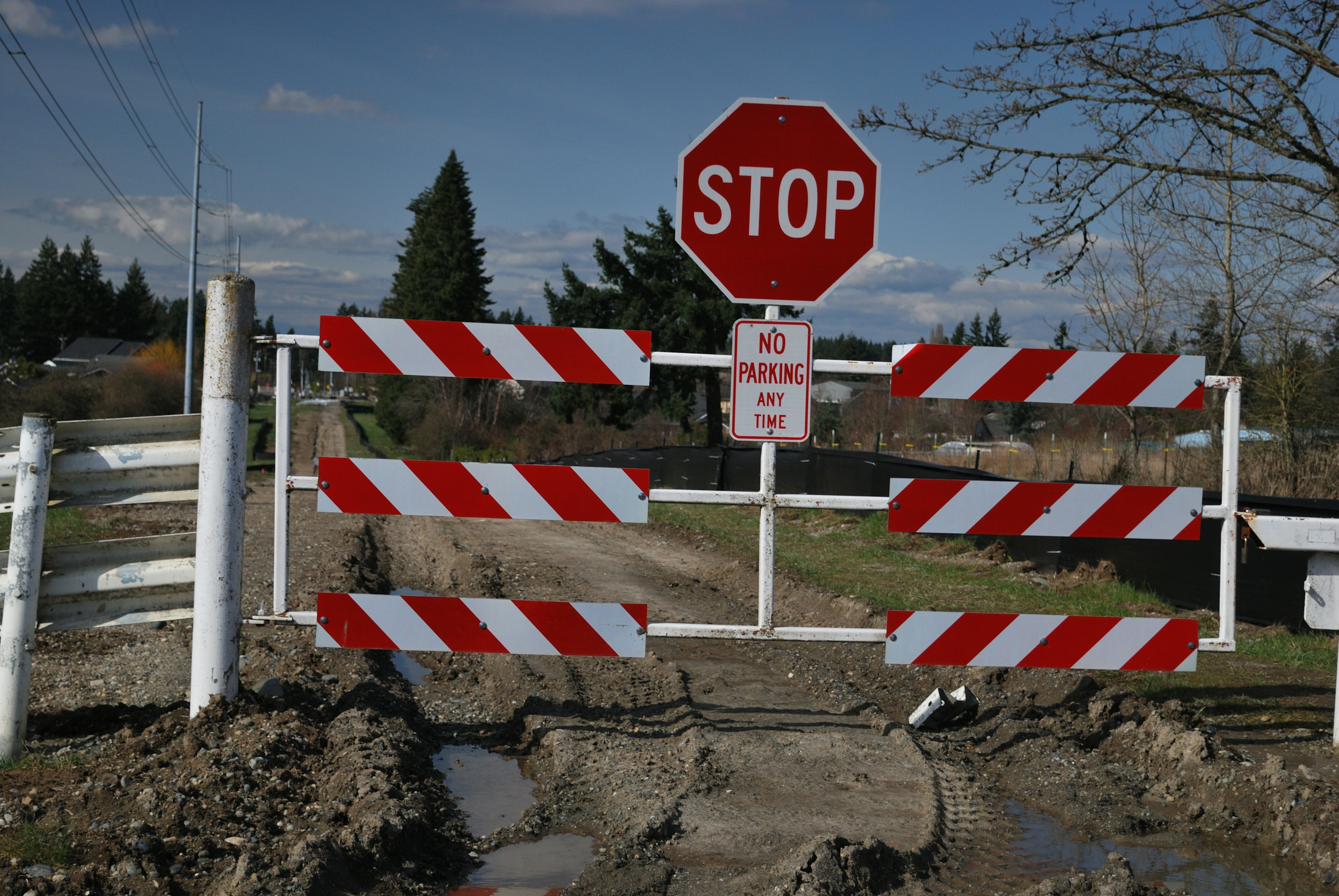 Stop Sign at the Barricade: Muddy Threshold to a Closed Site