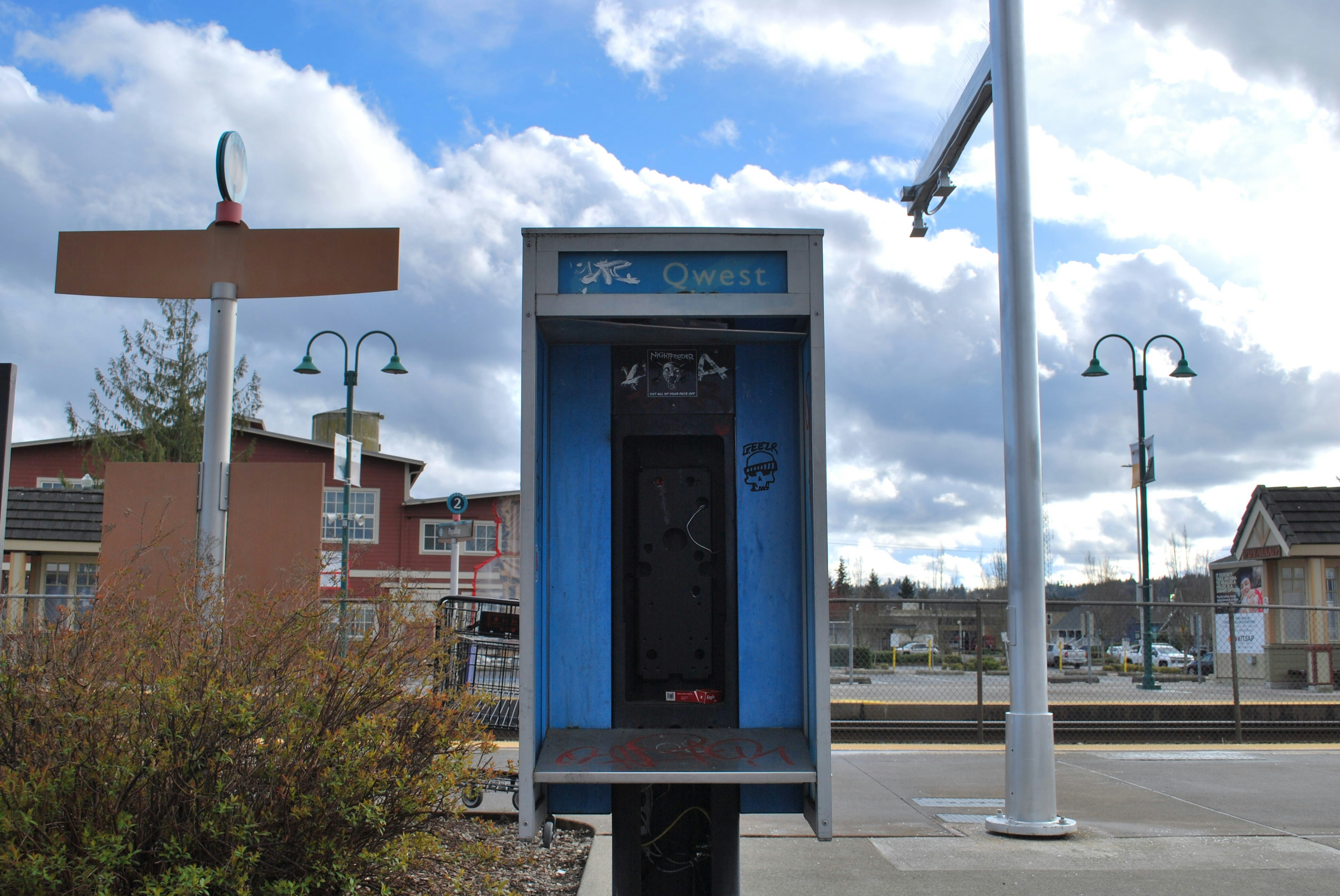 Standby Glass Booth at a Calm Transit Platform