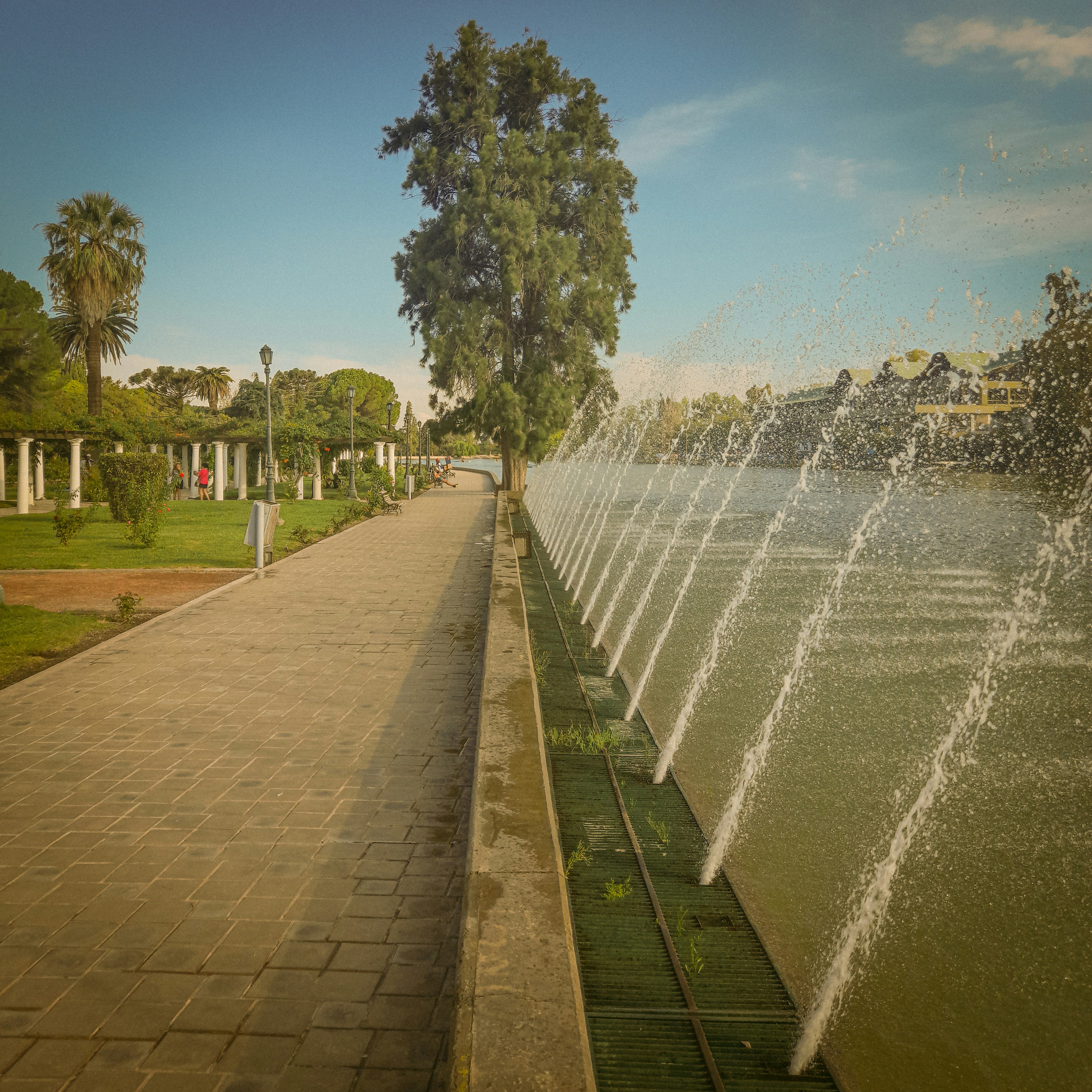 A water fountain spewing out water into the air photo – Free Argentina ...