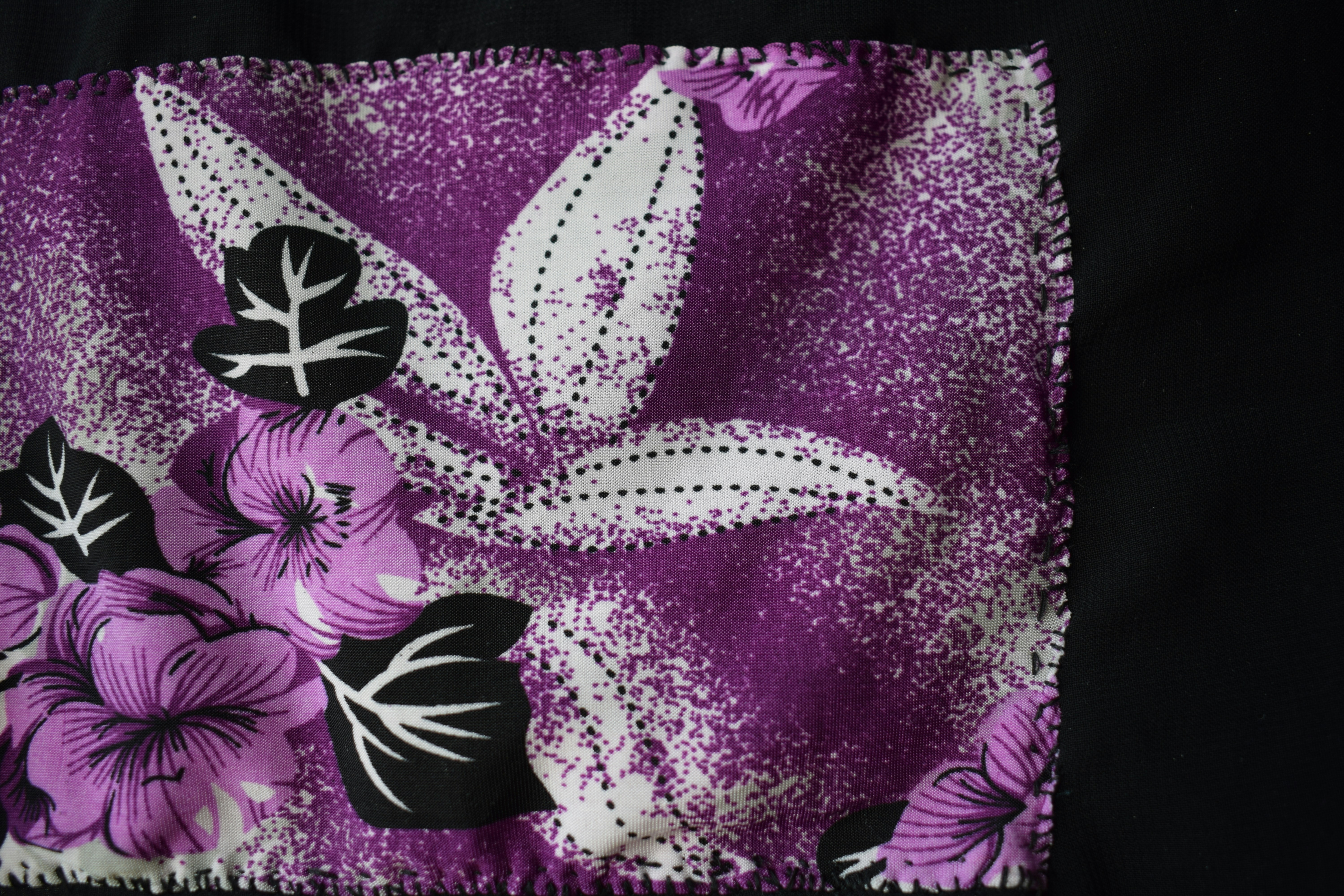 Purple Bloomed Patch on a Black Fold