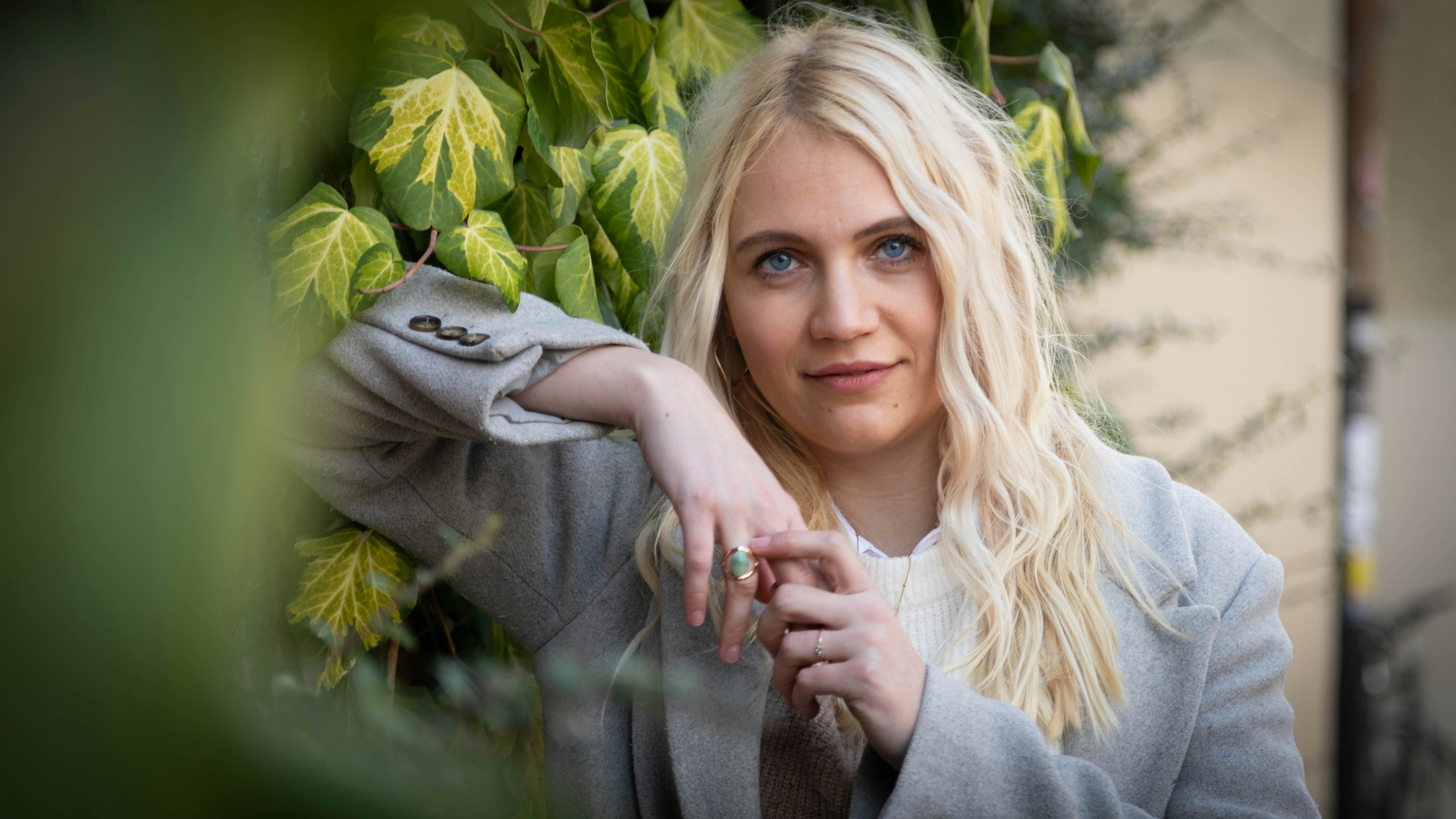Blonde Portrait Amid Autumn Leaves