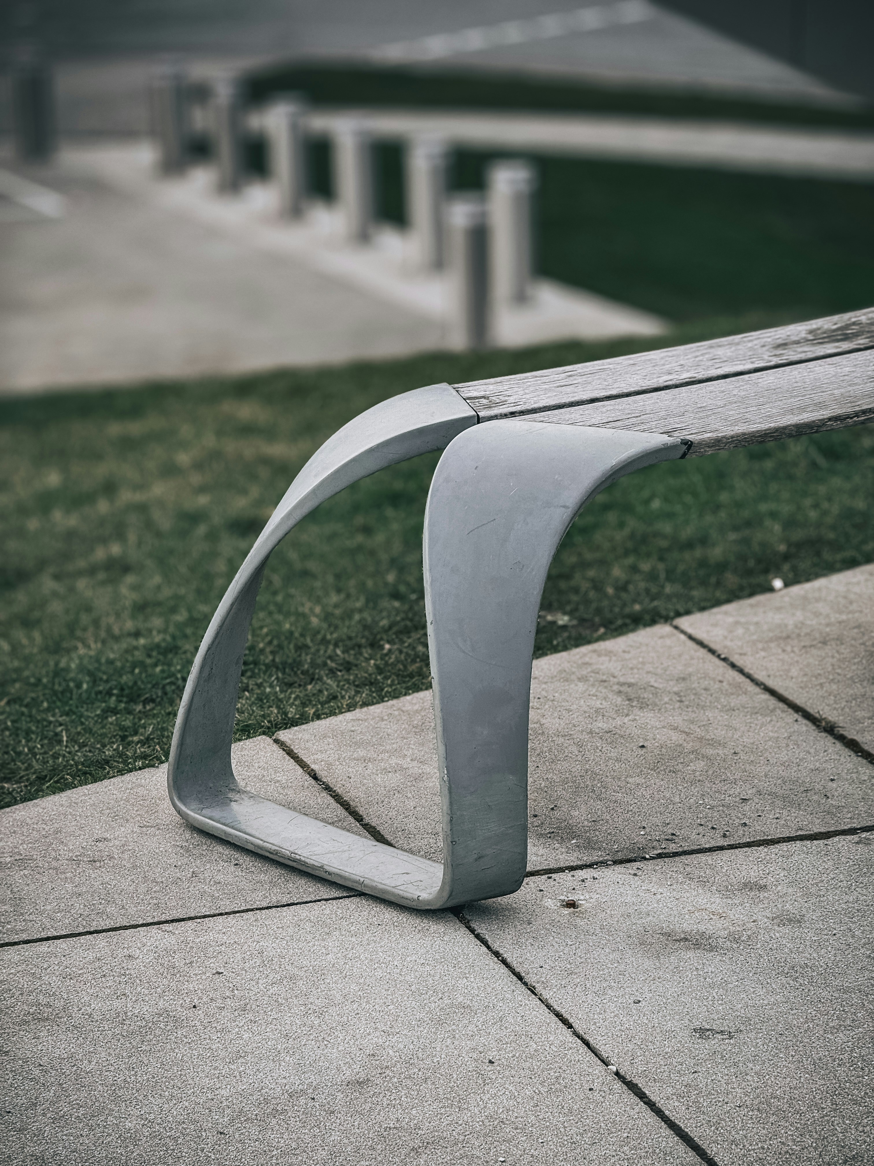 Looped Steel and Concrete: A Bench’s Quiet Gesture
