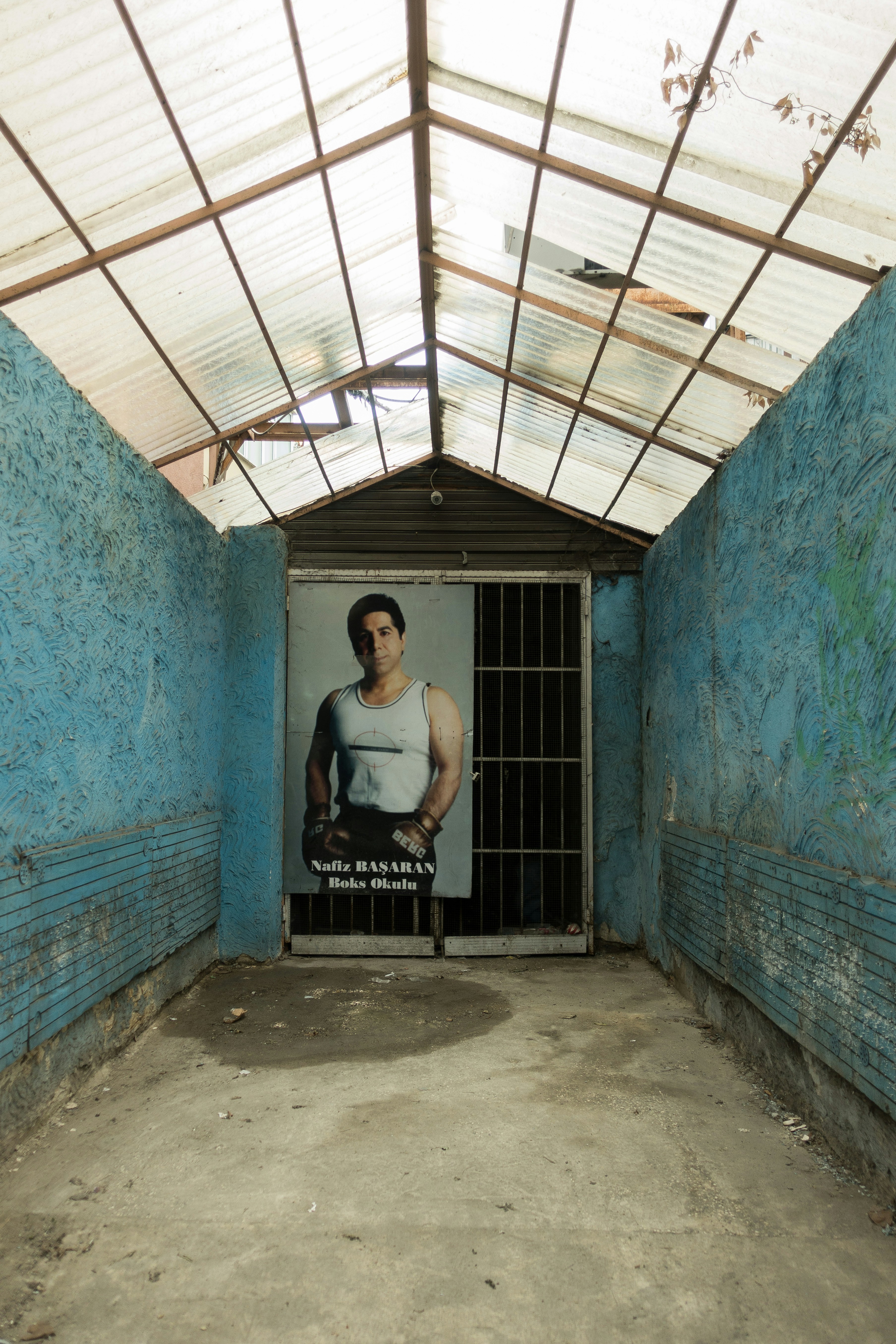 A jail cell with a poster of a woman behind bars photo – Free ...
