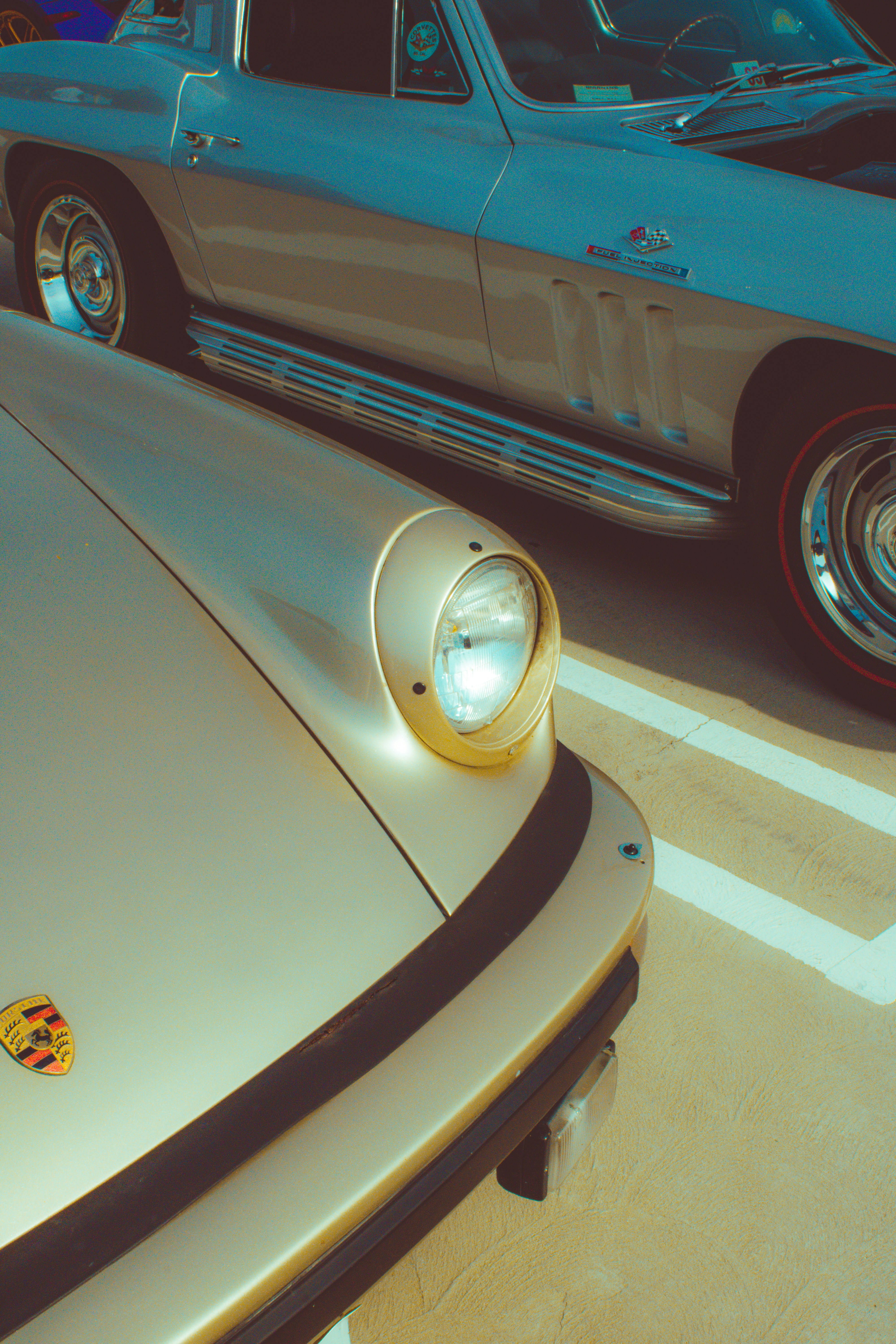 Cream Porsche and Blue-Silver Classics: A Quiet Parking-Lot Portrait