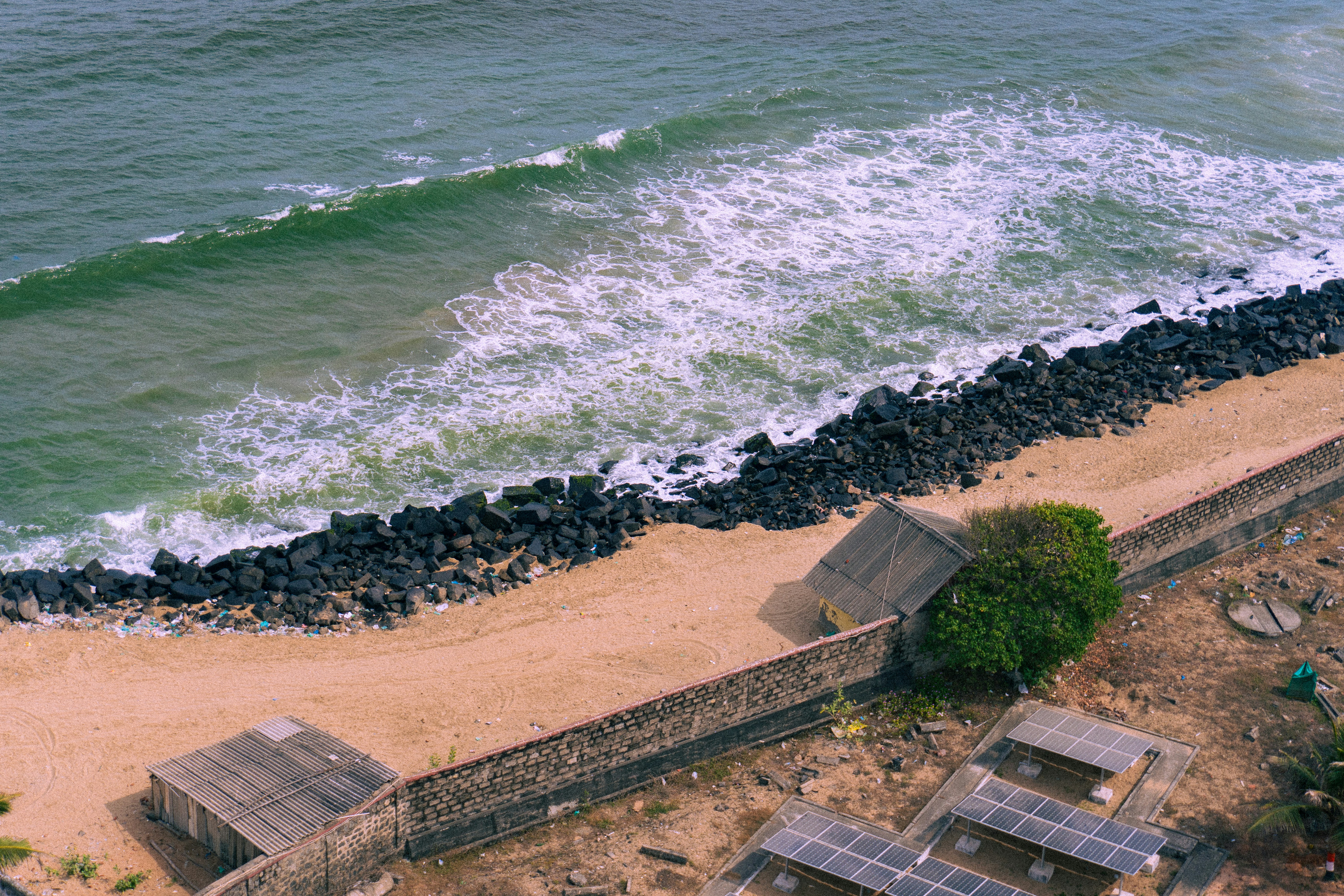 Solar Panels by the Breakwater: An Aerial Coastal Study