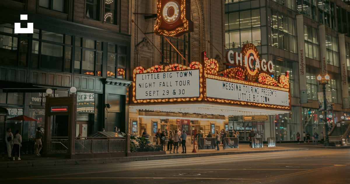 The Chicago Theater Marquee Is Lit Up At Night Photo Free Chicago