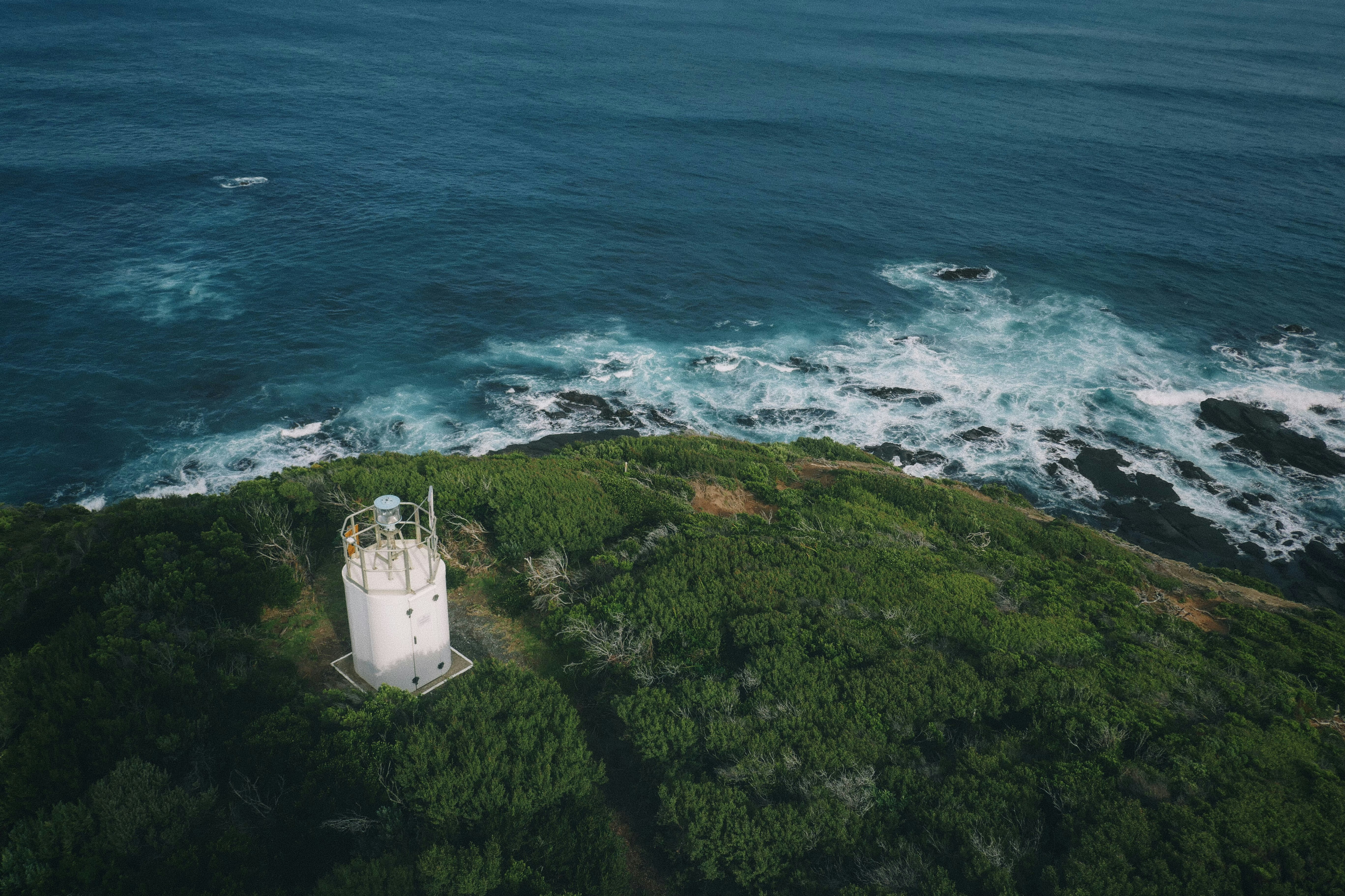 An aerial view of a lighthouse near the ocean photo – Free Melbourne ...
