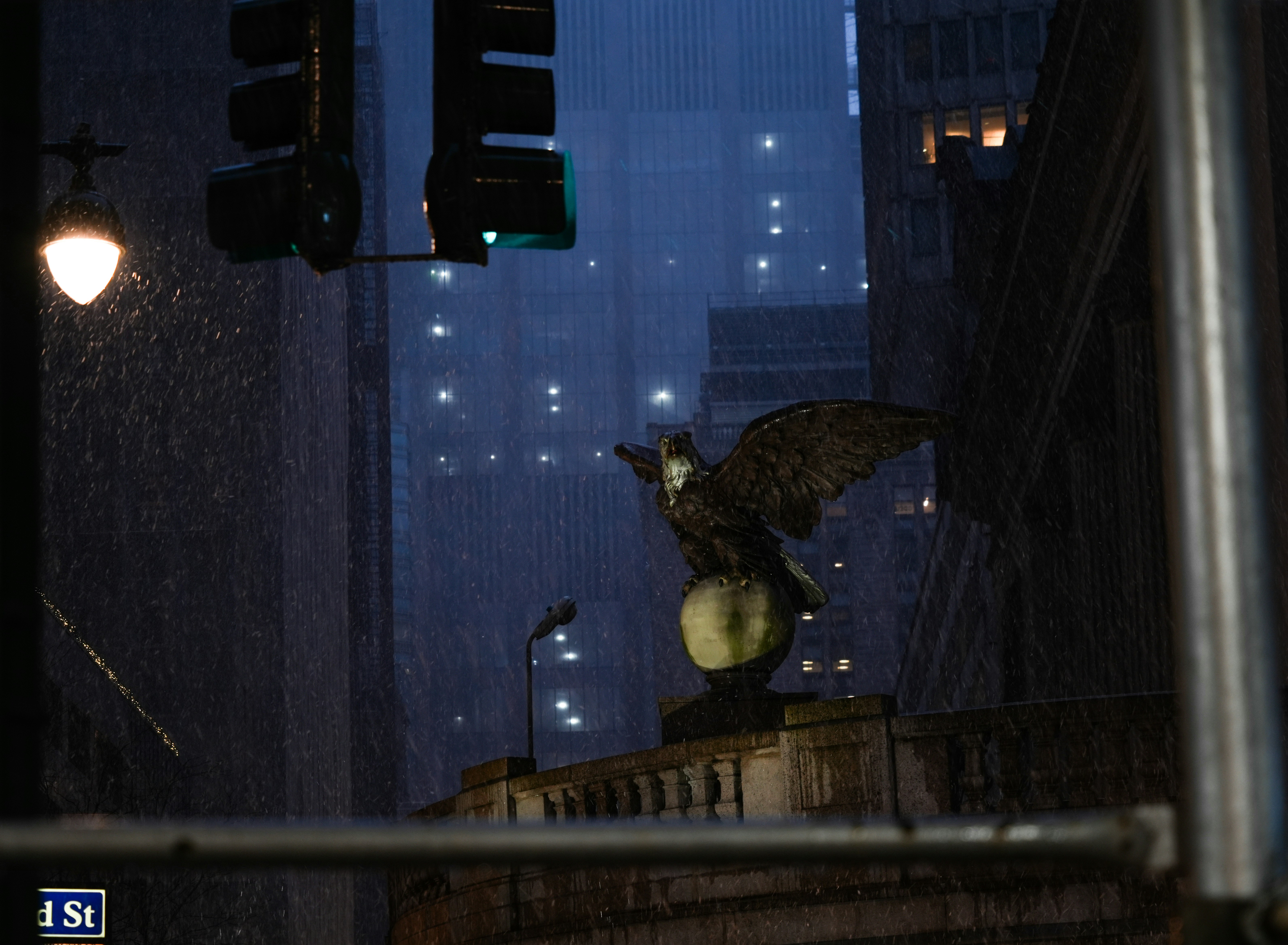 Winged Sentinel Over Neon Rain on a Night City Street