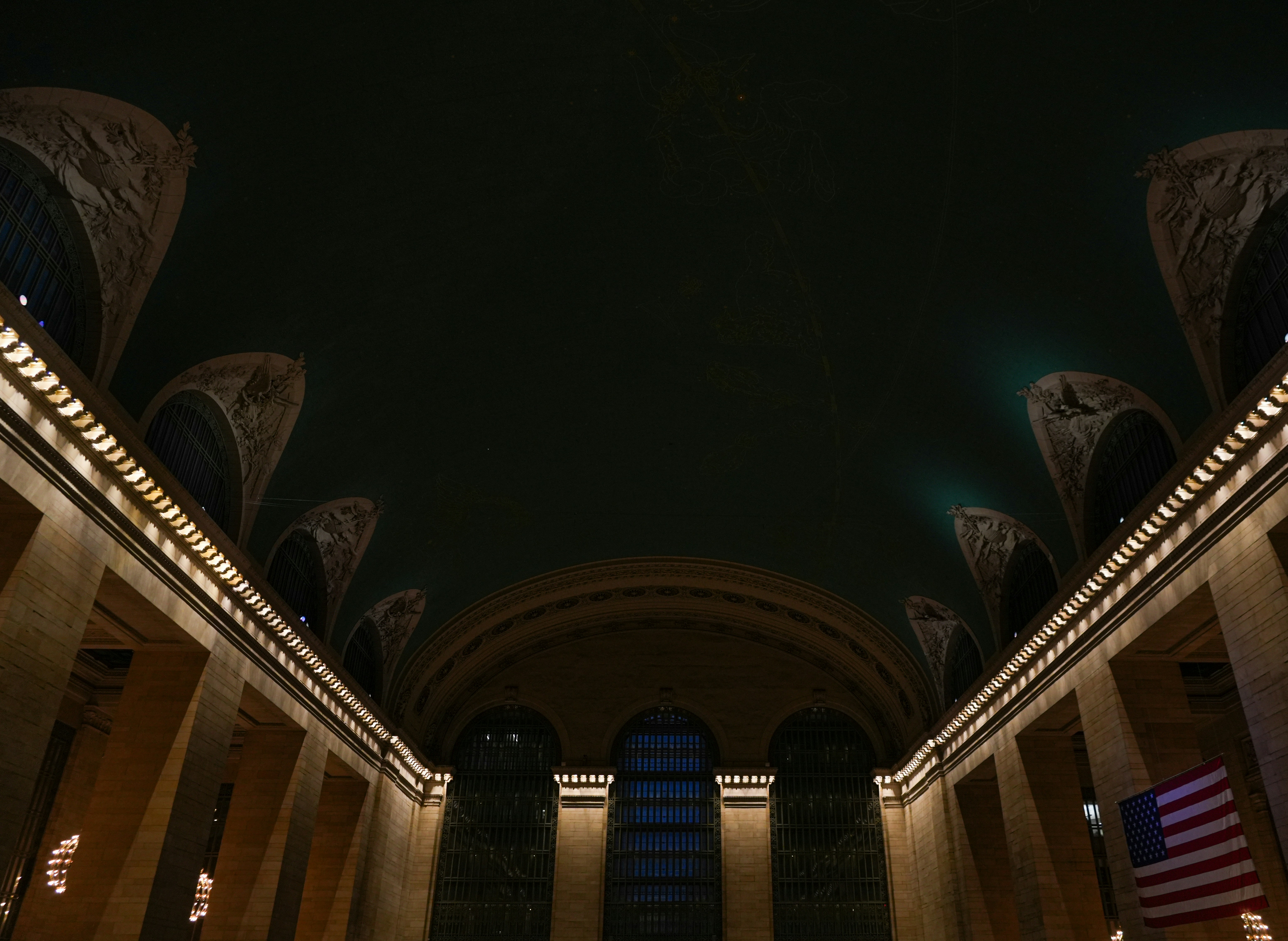 Blue-Lit Atrium at Midnight: A Symmetrical Nightscape