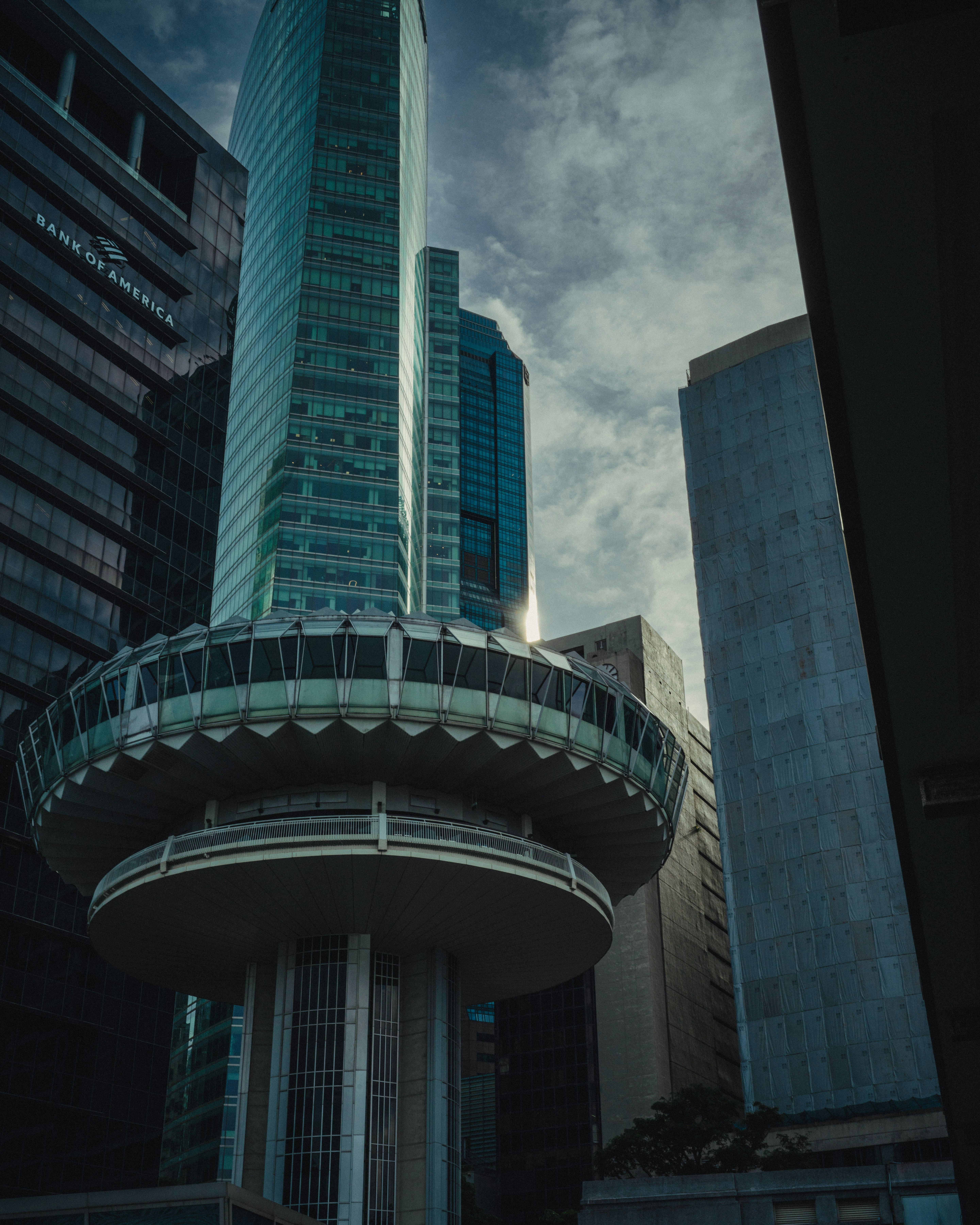 A very tall building next to some very tall buildings photo – Free ...