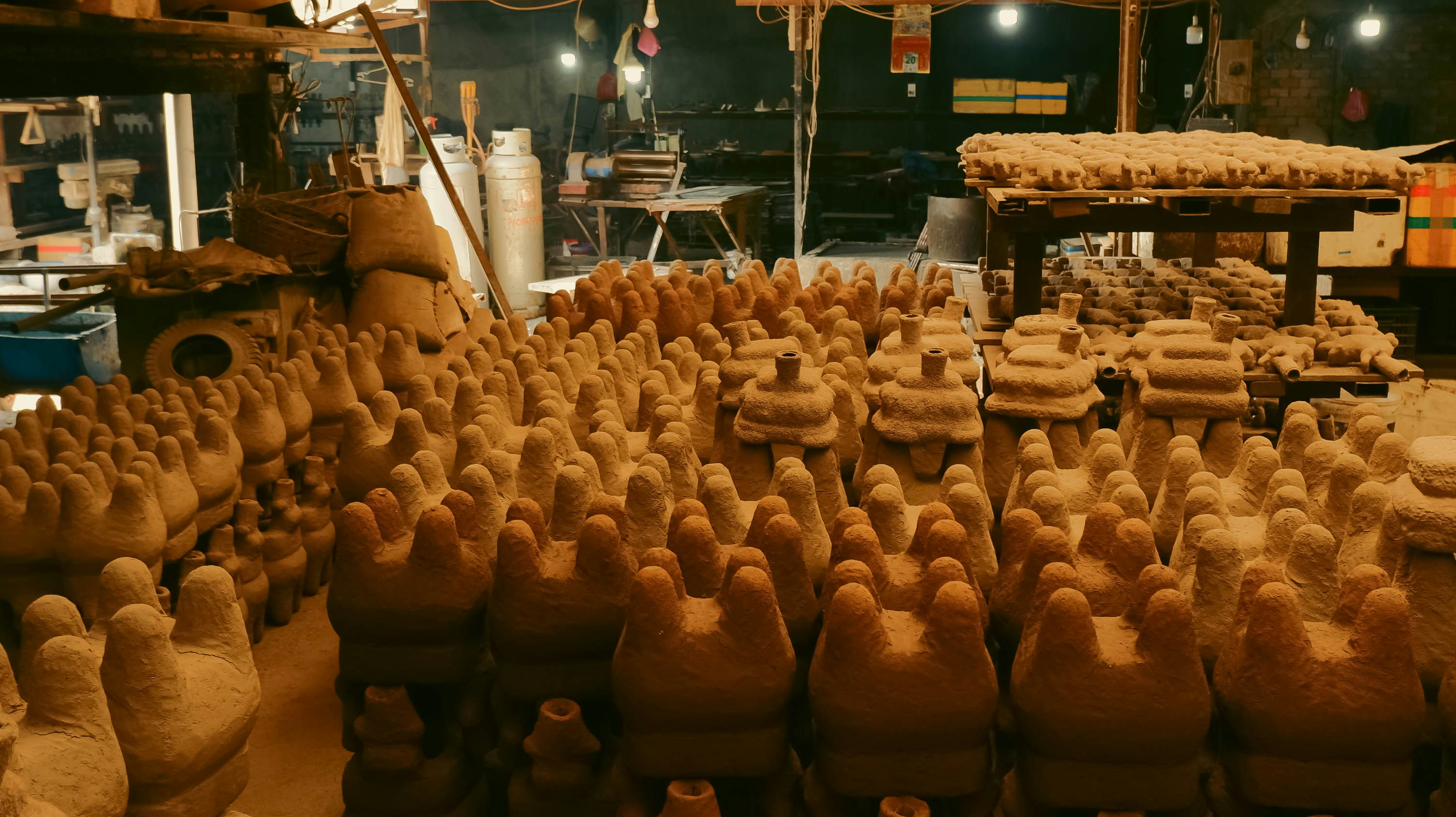 Amber Rows: A Pottery Workshop's Quiet Army of Clay Figures