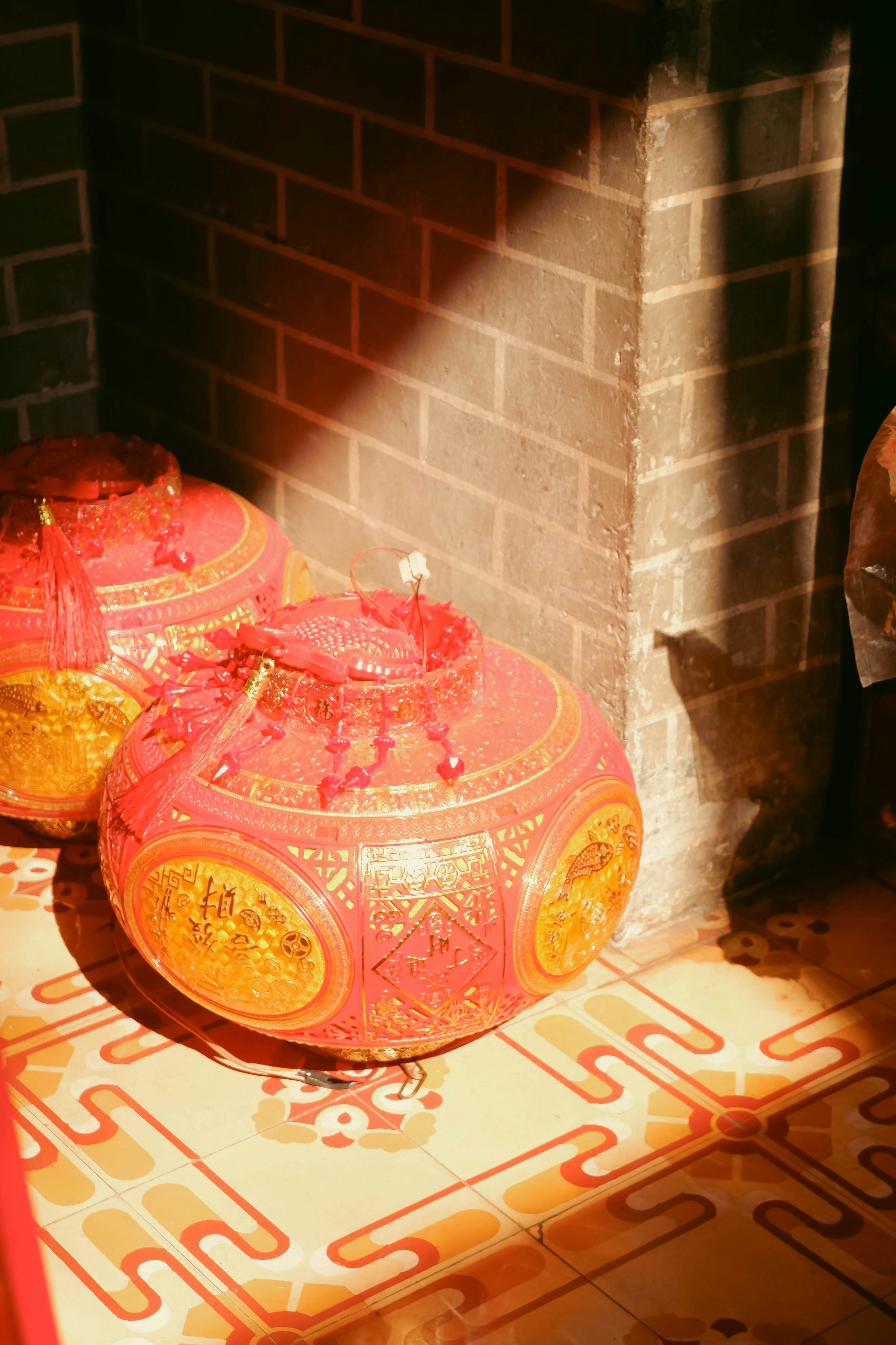 Lanterns in Shadows: Chinese New Year Glow by the Tile Floor