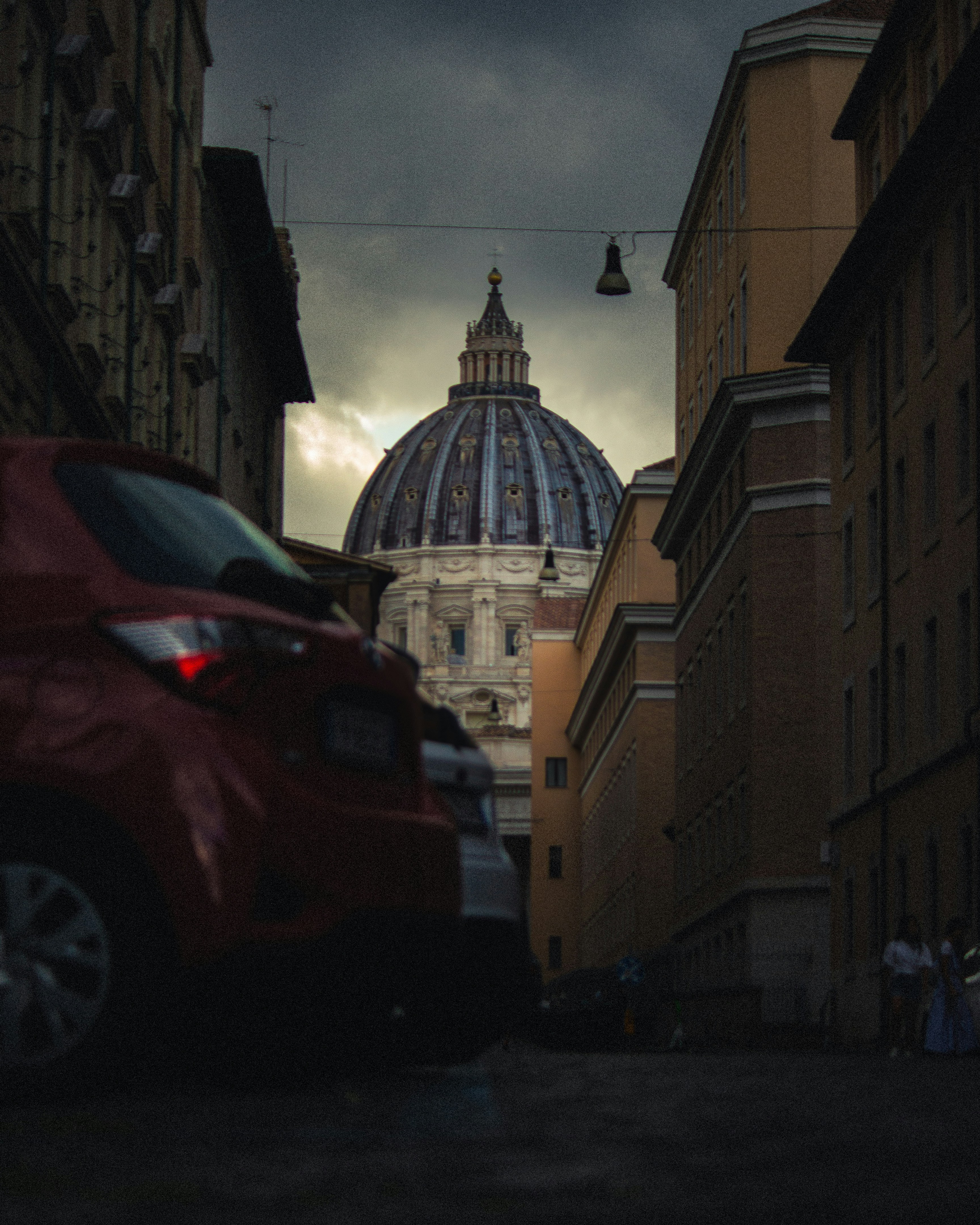 Alley to the Dome: Rome’s Evening Street Framing a City Icon