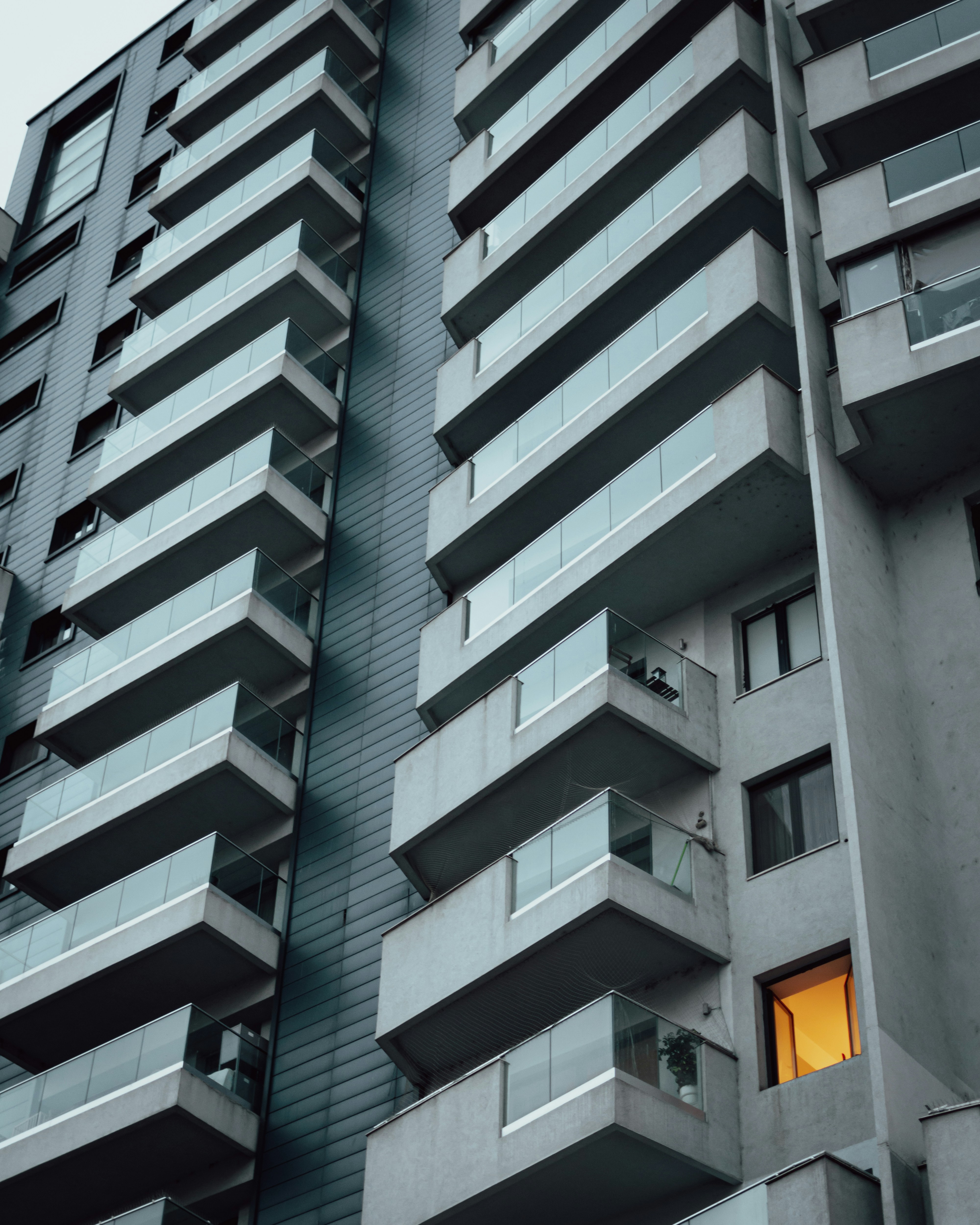 A tall building with balconies and balconies on it photo – Free Urban ...
