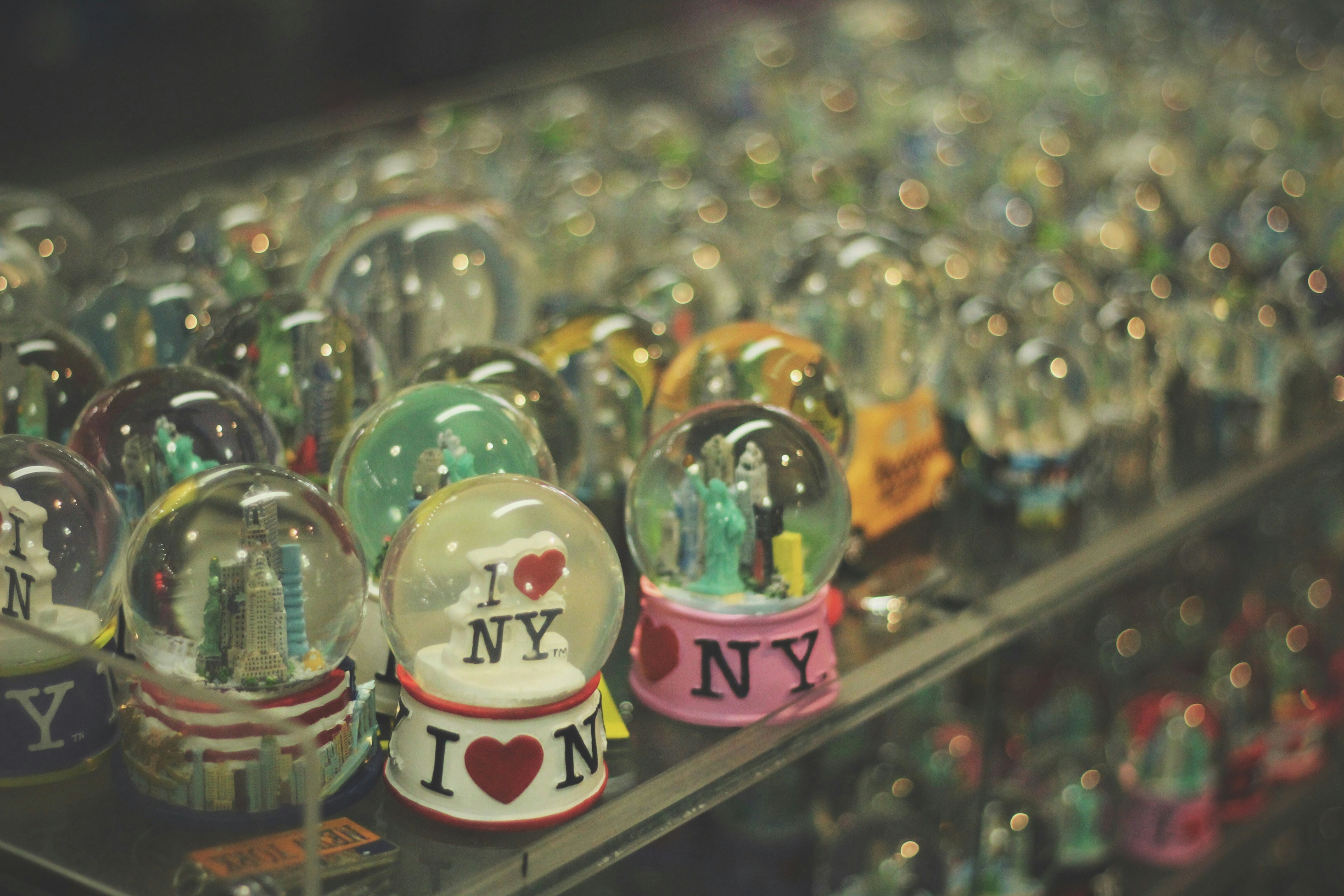 A bunch of snow globes that are on a shelf photo – Free Christmas Image ...