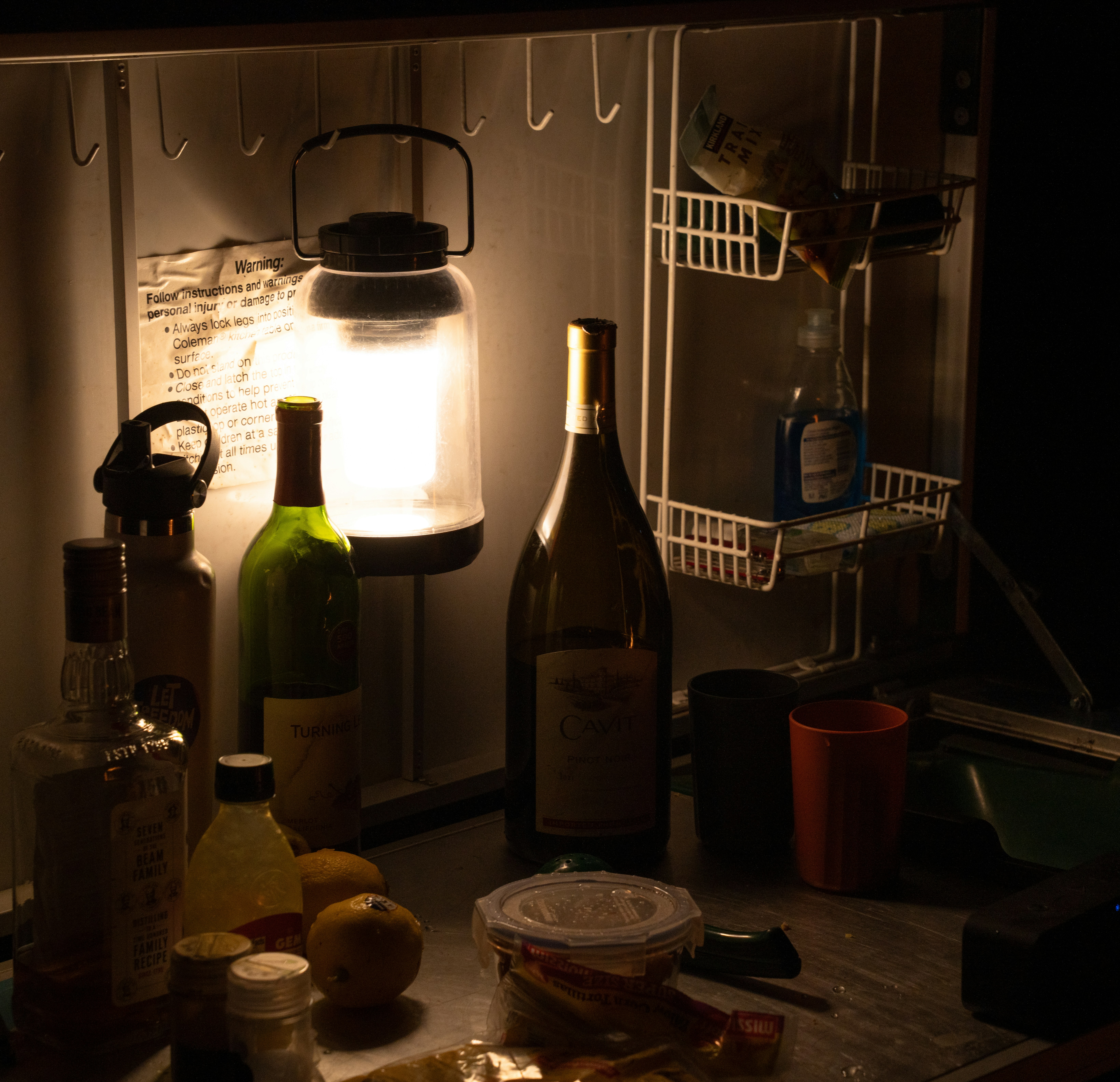Amber Lantern Over a Quiet Kitchen Still-Life