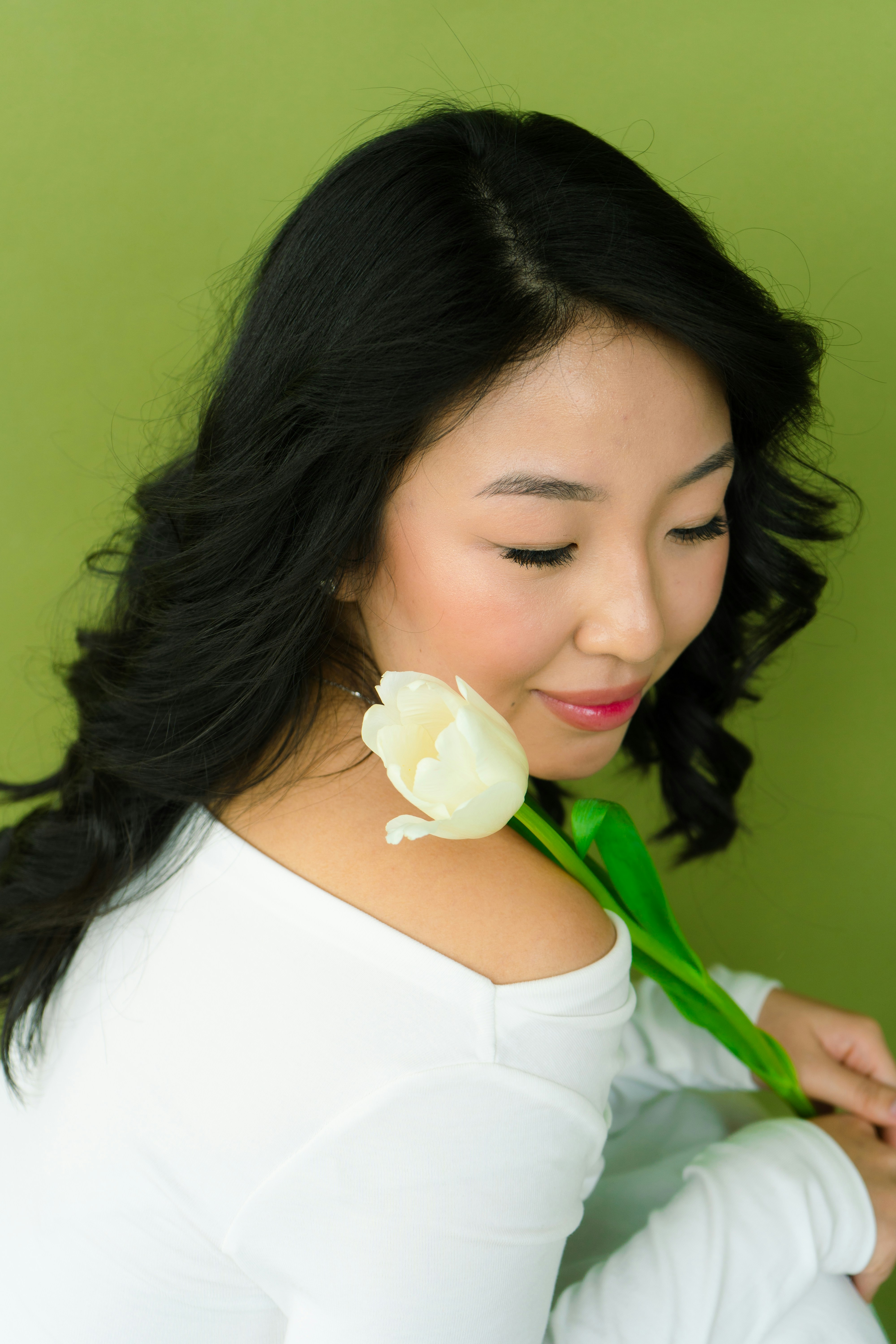 a woman with a flower in her hair