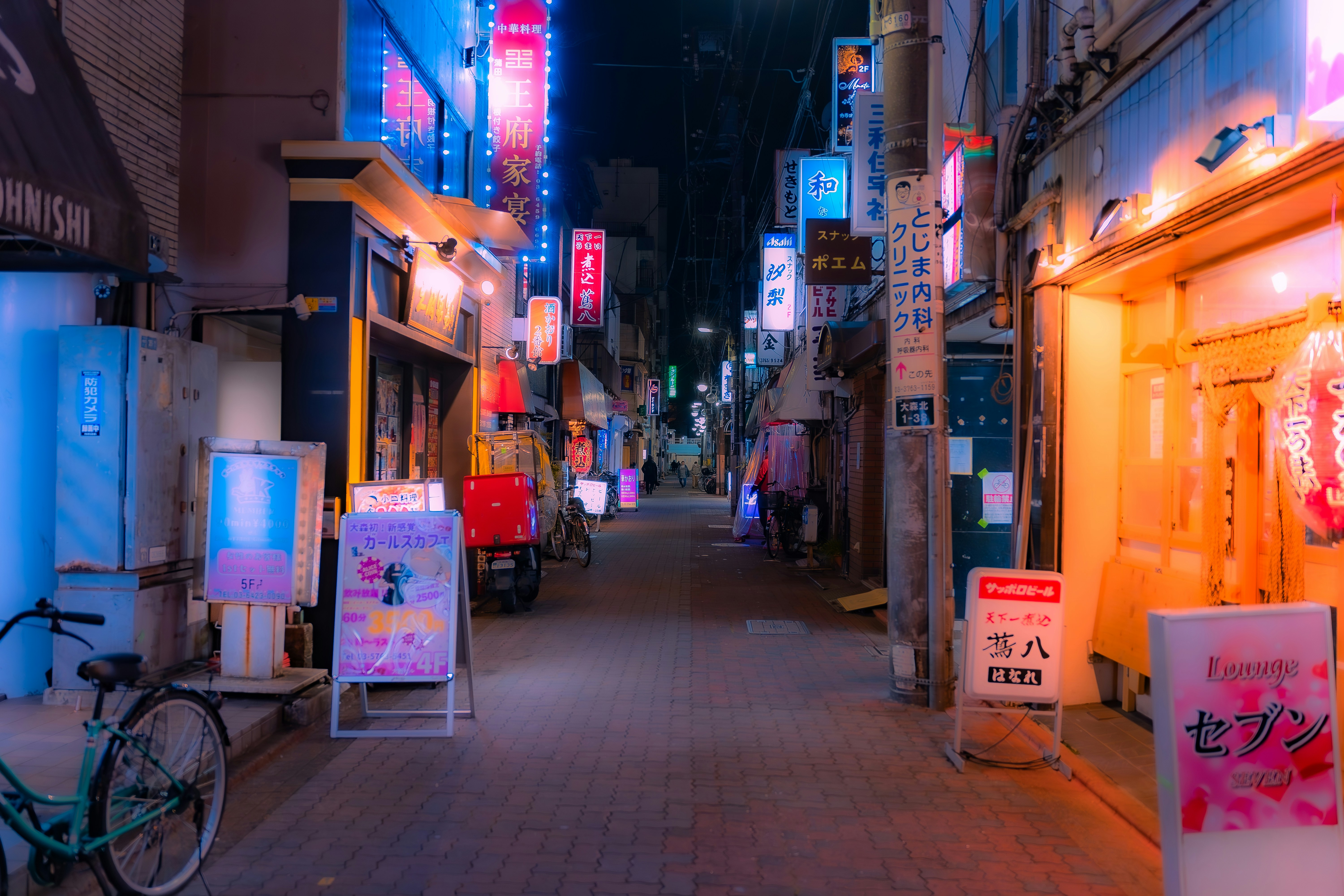 A city street at night with neon signs photo – Free Tokyo omori Image ...
