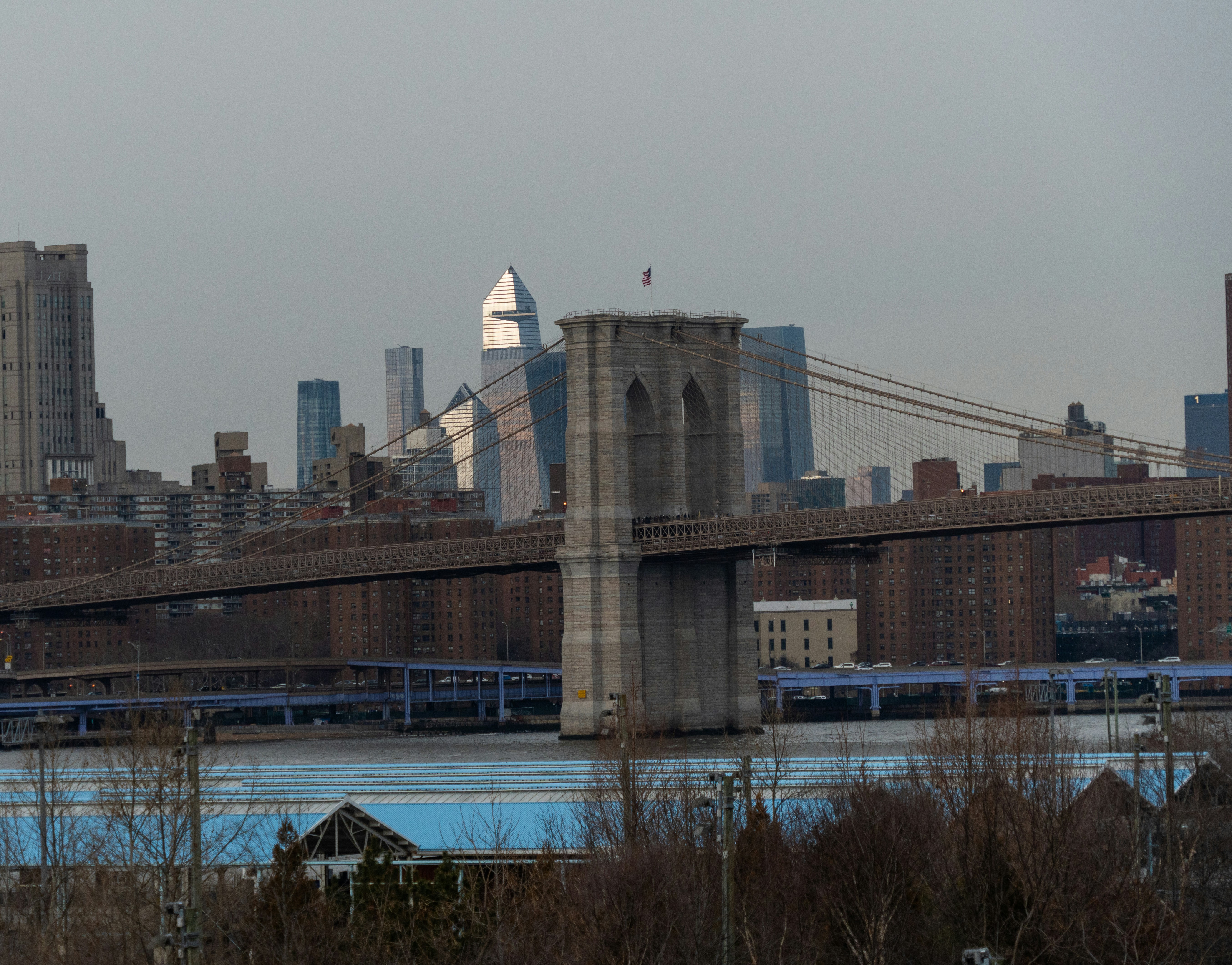 a view of a bridge over a body of water