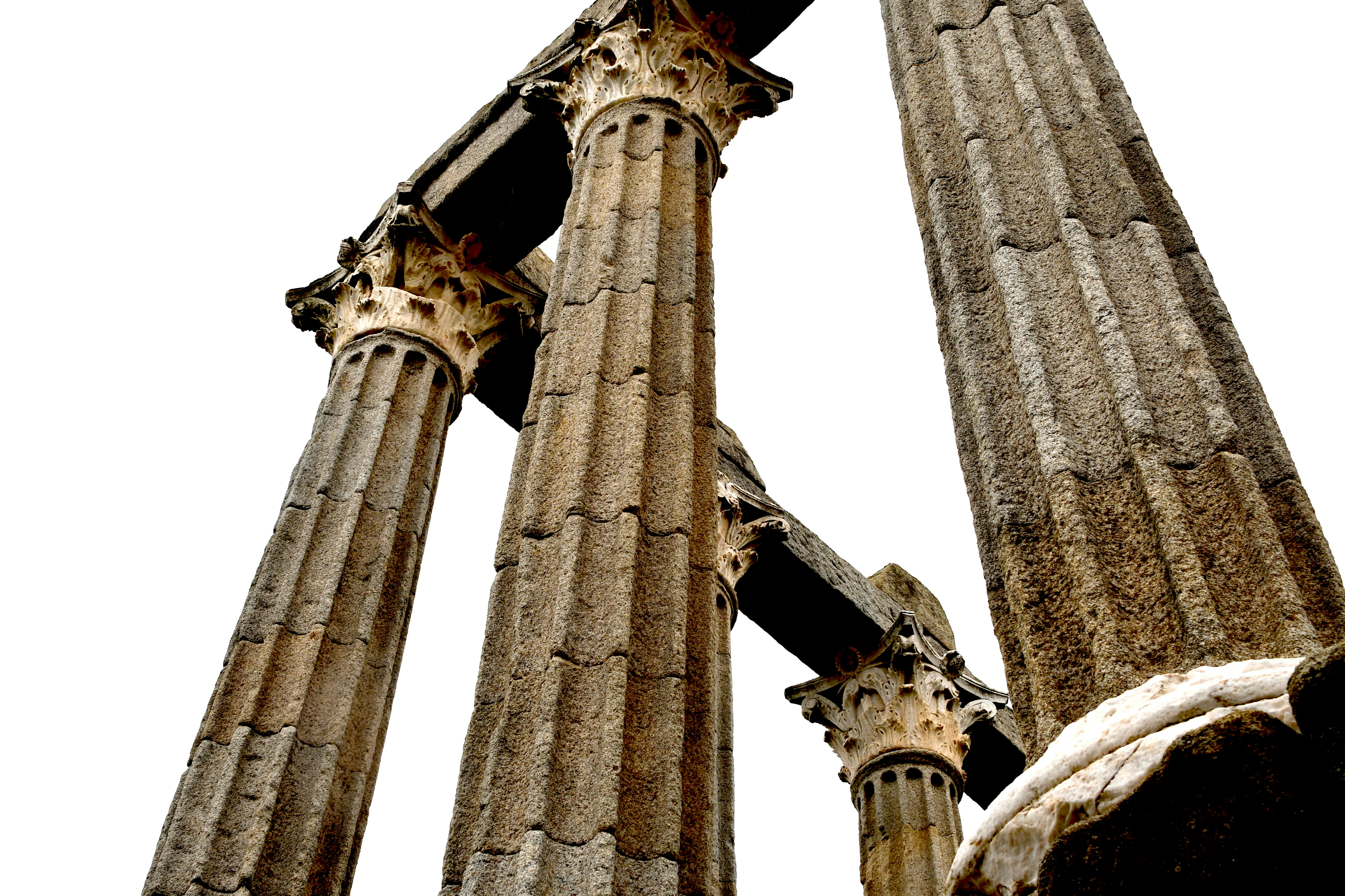 A group of tall stone pillars standing next to each other photo – Free ...