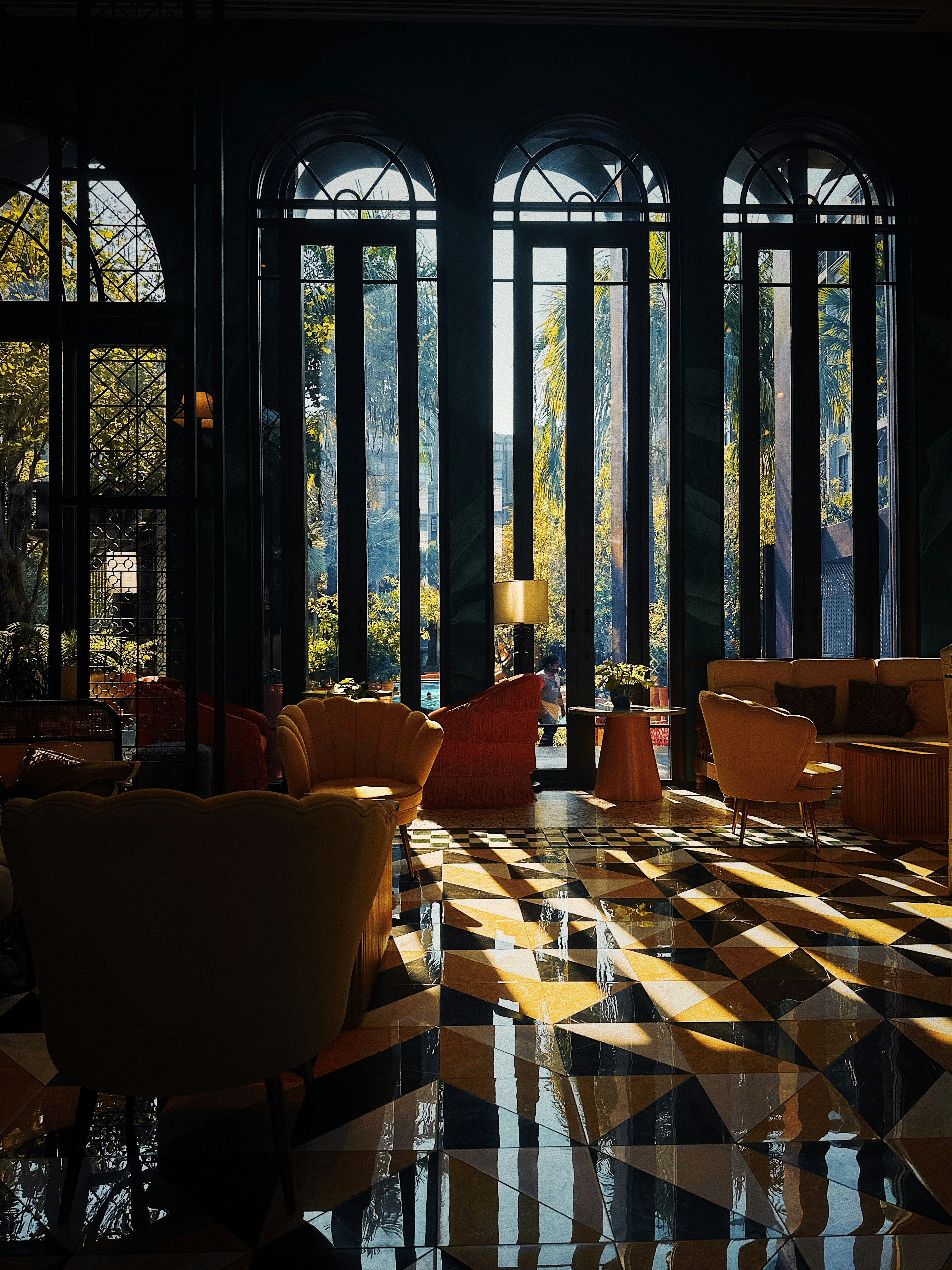 A room with a checkered floor and large windows photo – Free Hua hin ...