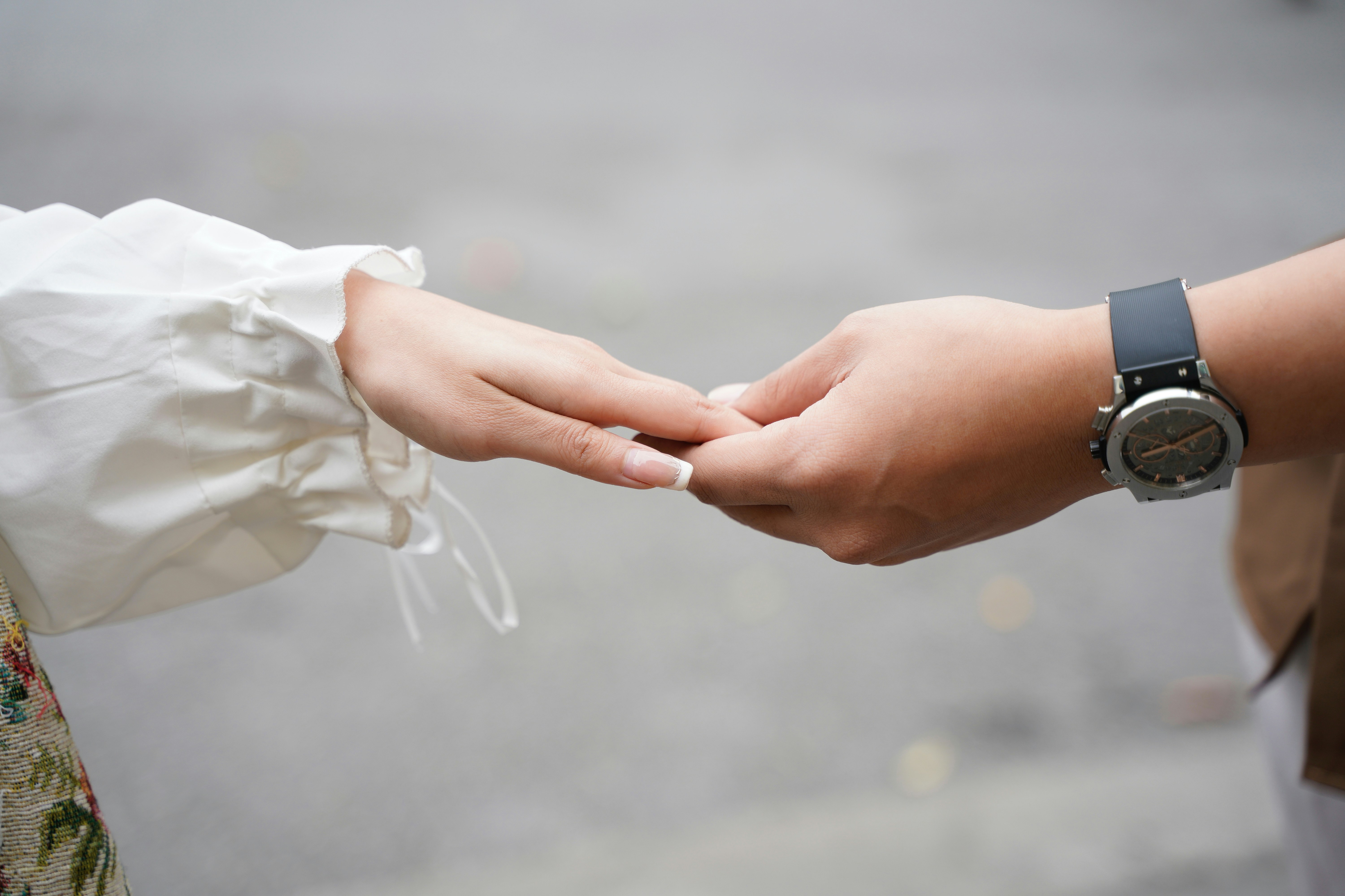 A couple of people that are holding hands photo – Free Hand Image on ...