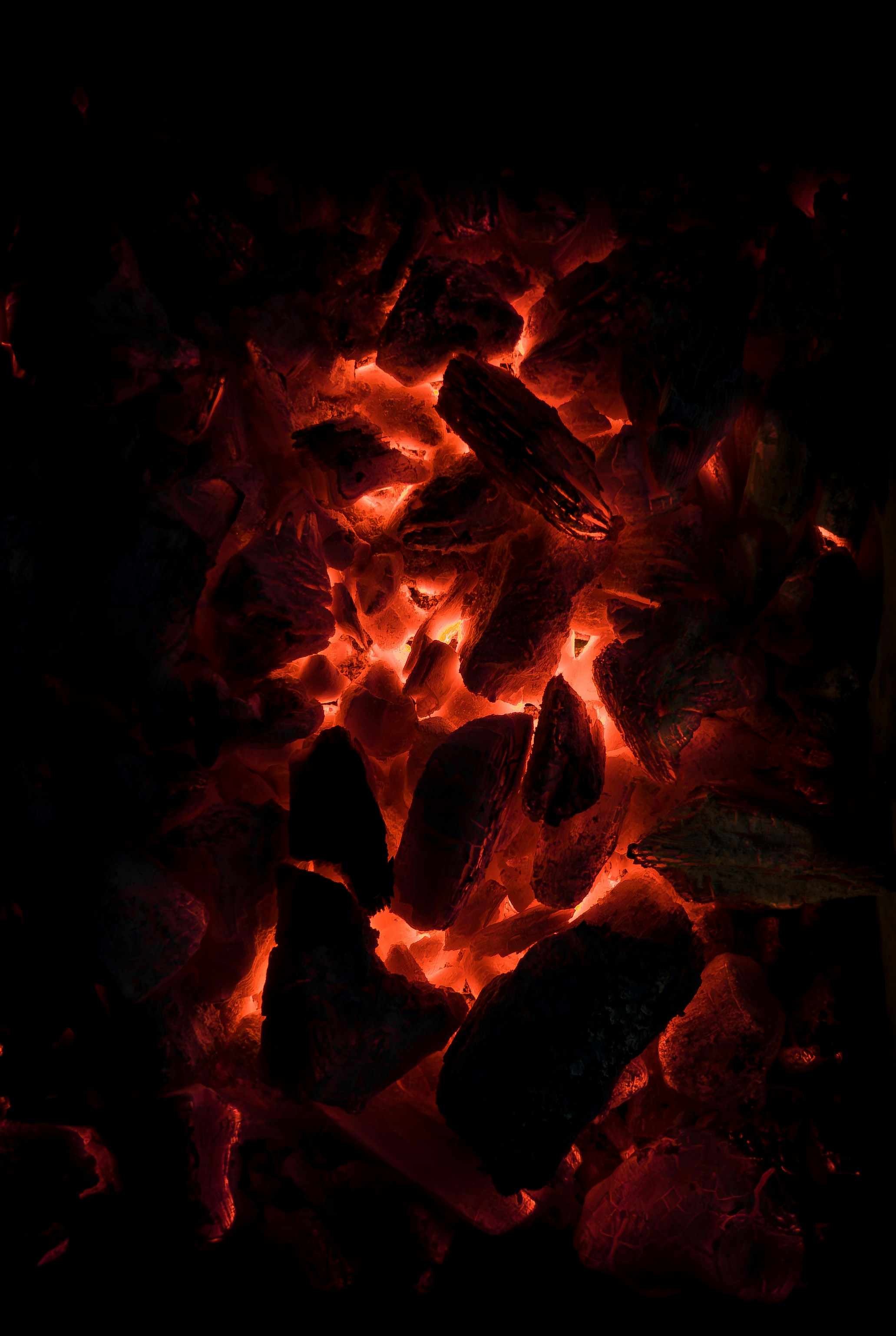 A close up of a fire with rocks in it photo – Free Fire Image on Unsplash