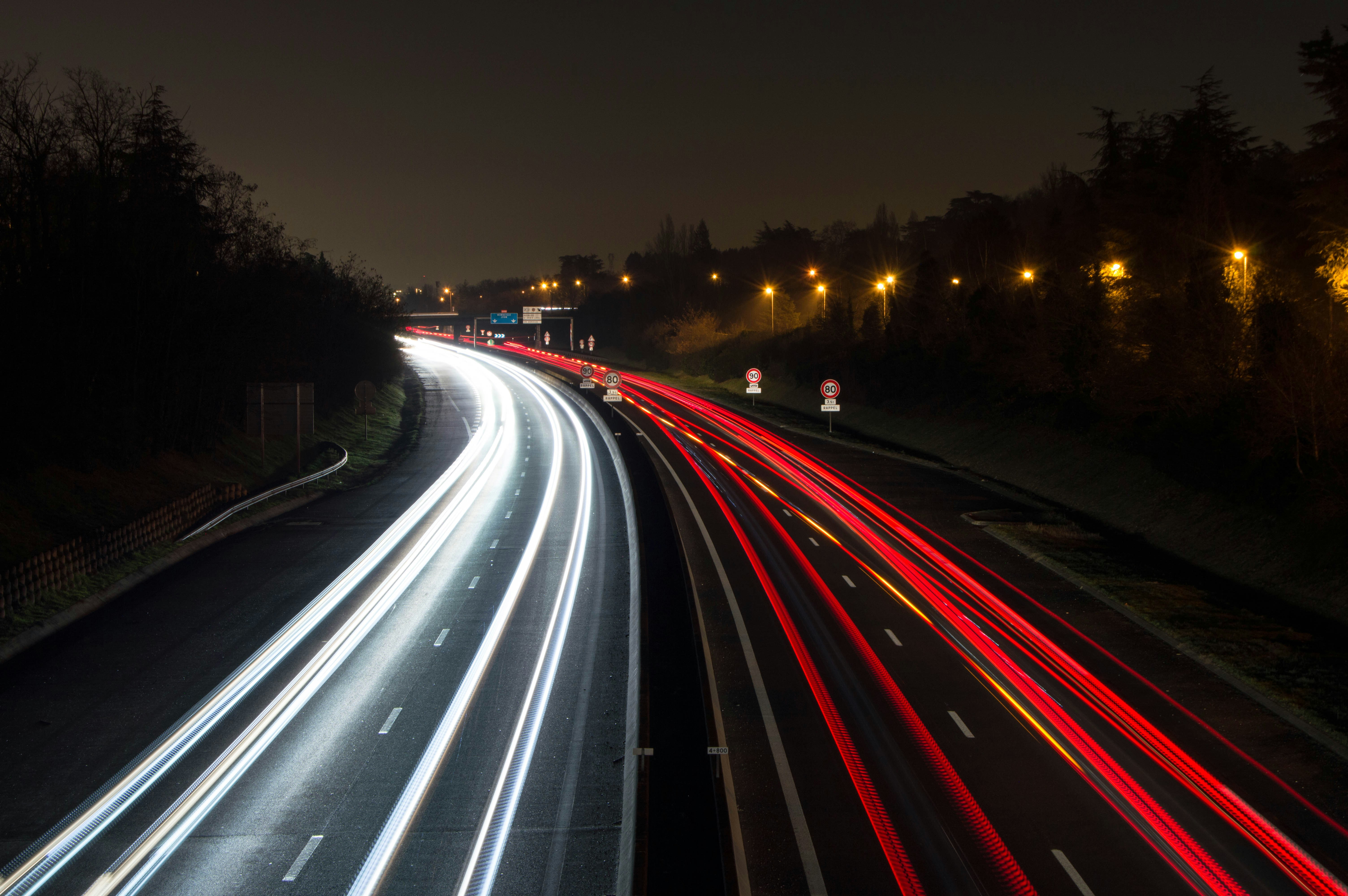 A long exposure photo of a highway at night photo – Free France Image ...