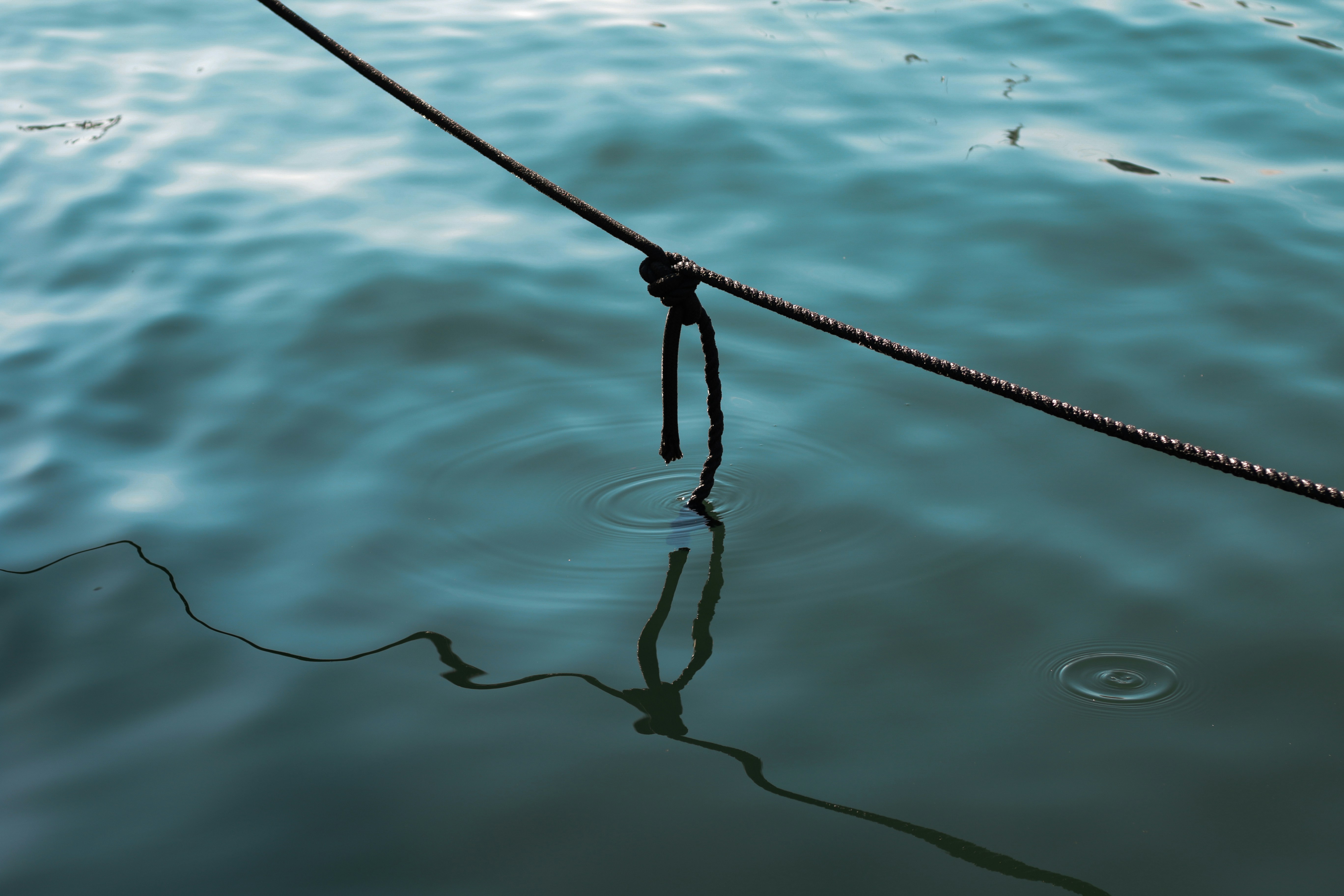 A rope that is connected to a body of water photo – Free Sochi Image on ...
