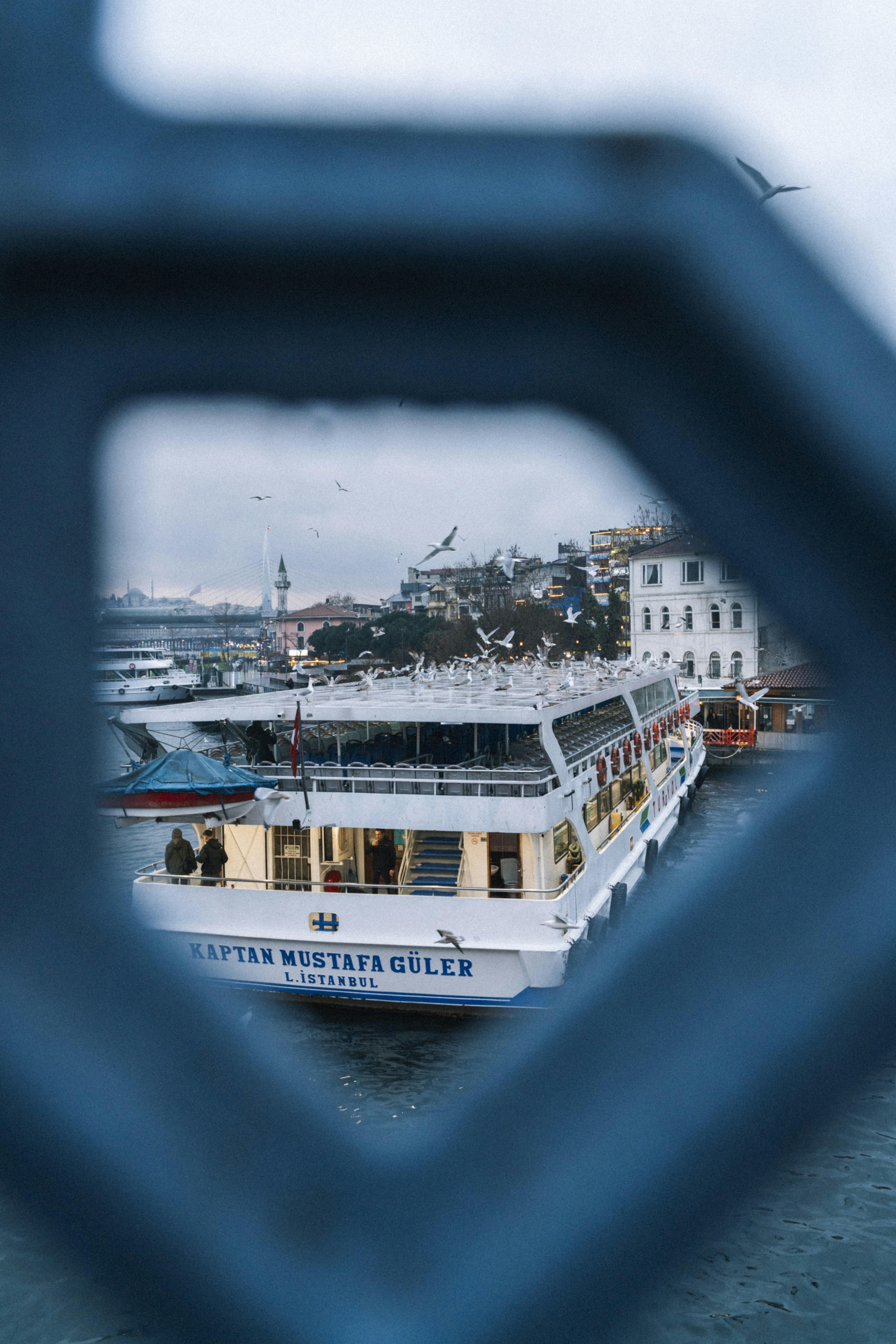 Blue-Framed Istanbul Ferry: Kaptan Mustafa Güler at the Waterfront
