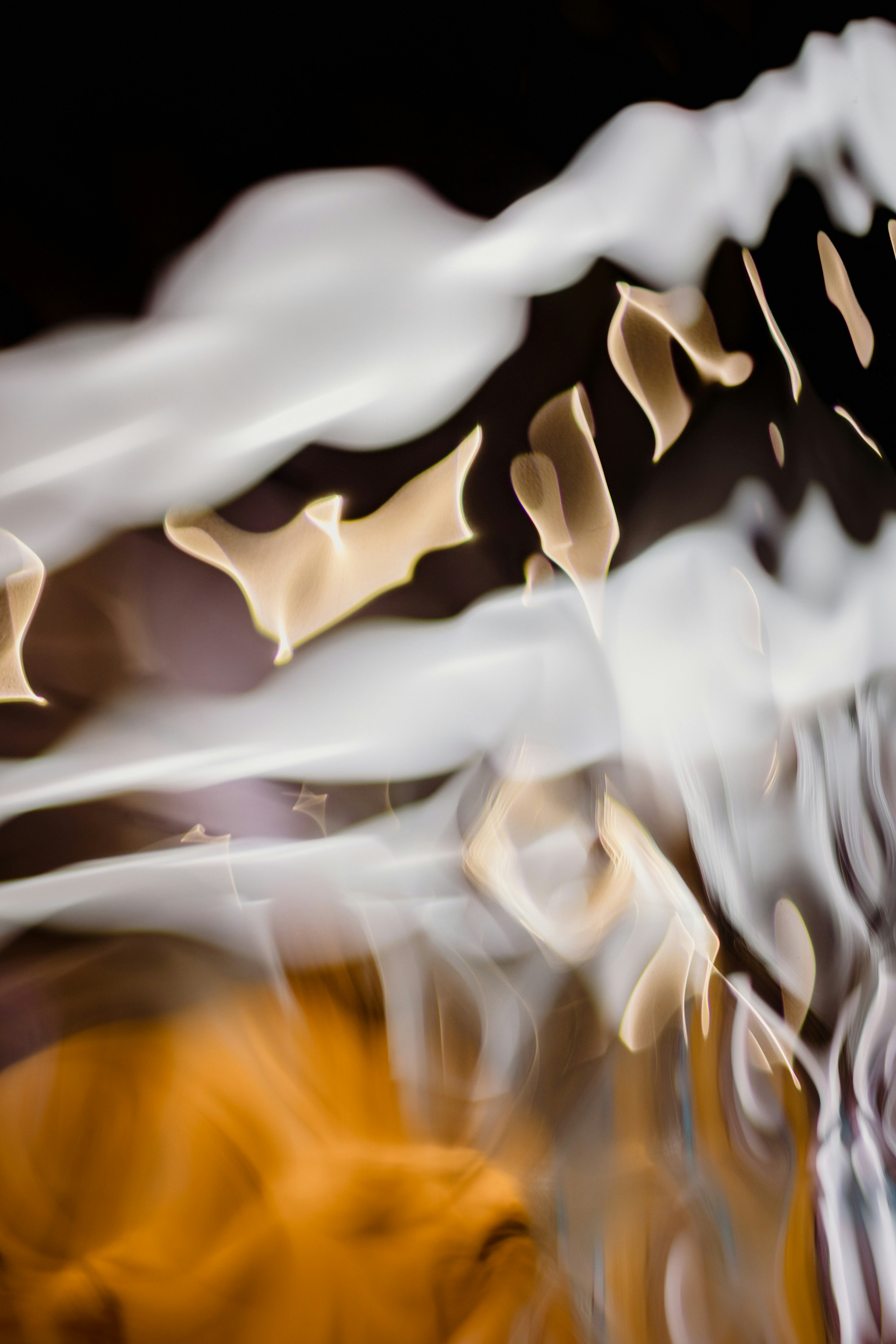Whispers of Flame in a Blurred Gallery
