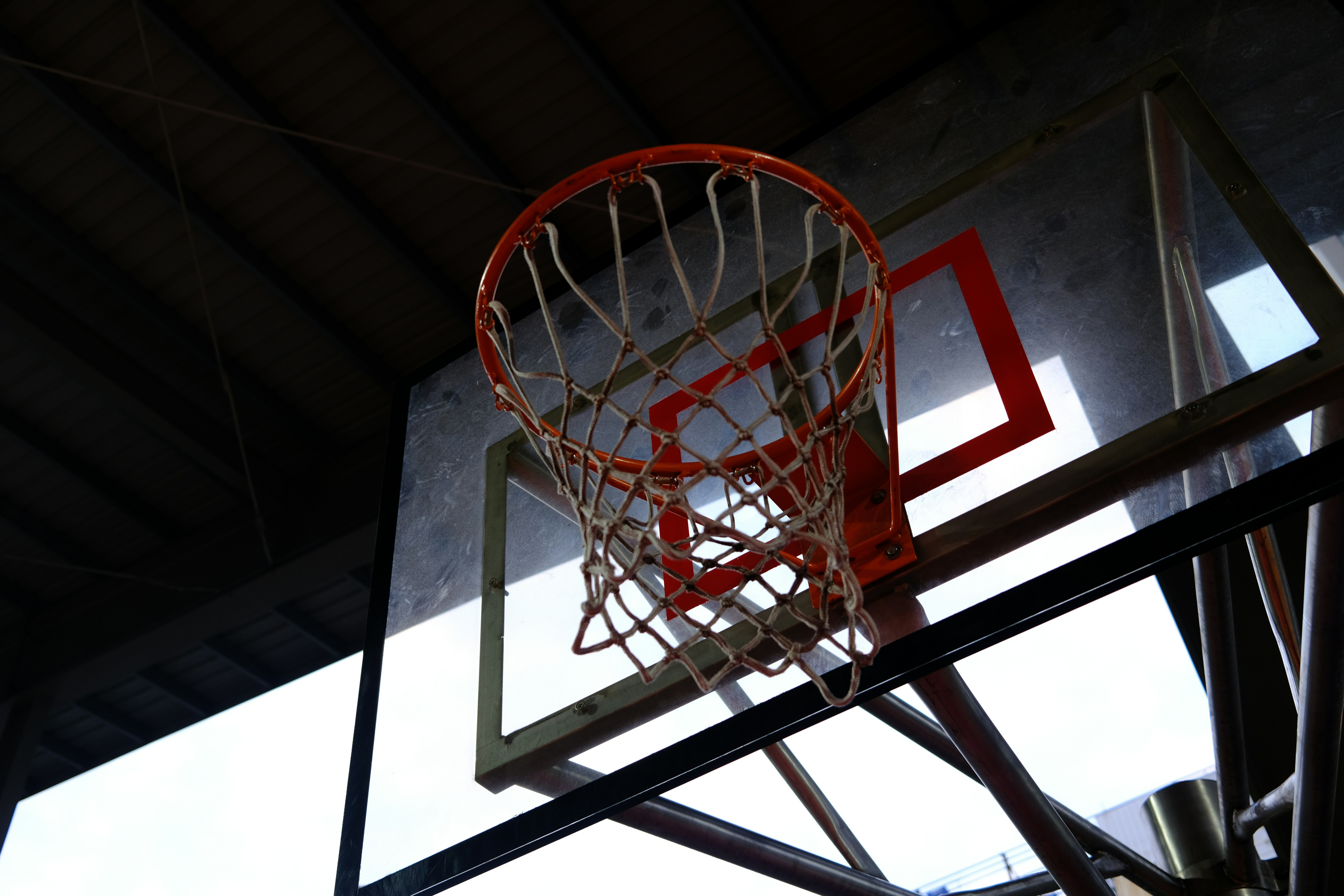 A basketball hoop with a basketball inside of it photo – Free ...