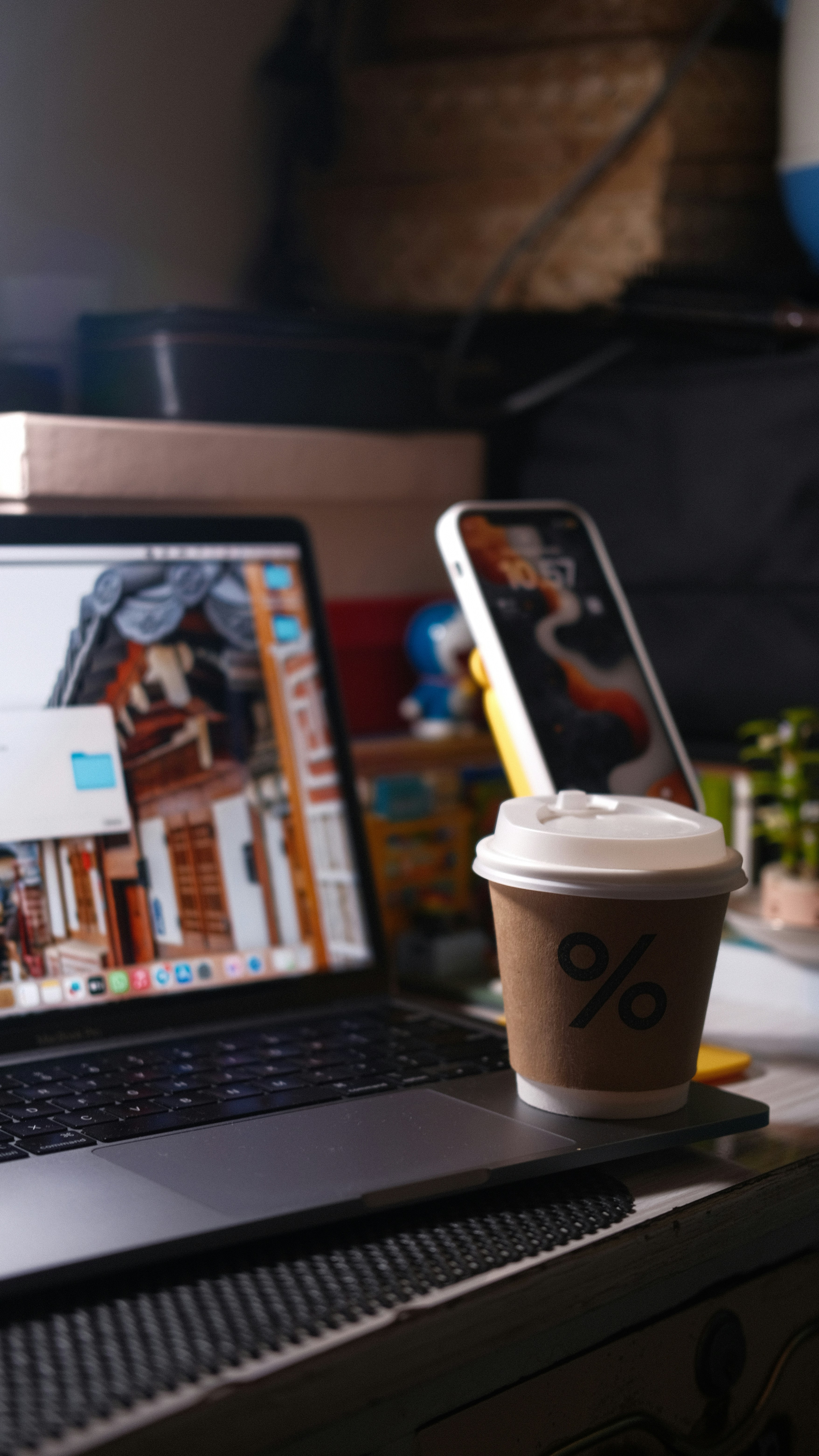 A cup of coffee sitting on top of a laptop computer photo – Free Coffee ...