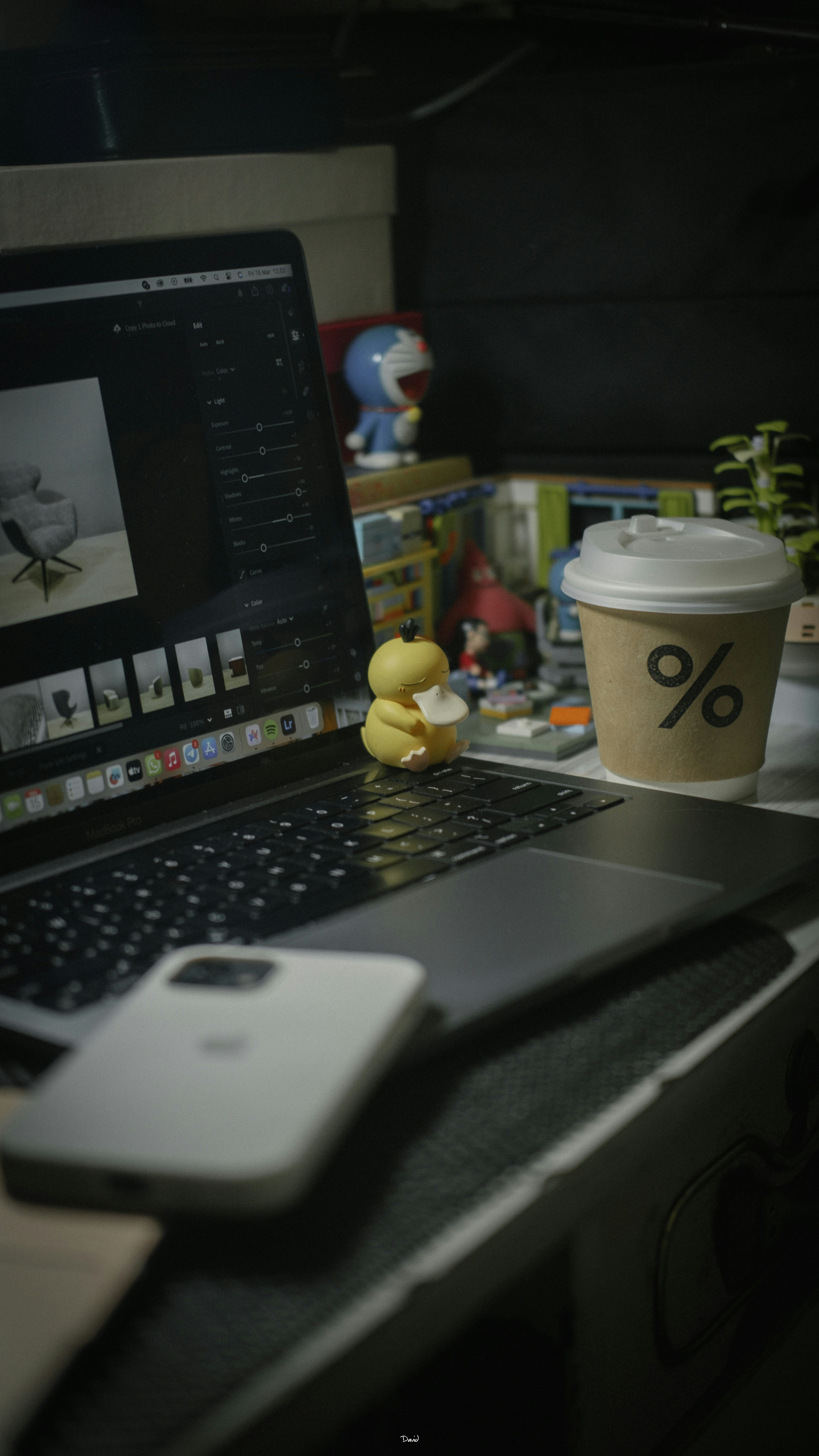 Tiny Duck, Quiet Focus: A Desk Still Life of Tech and Treats