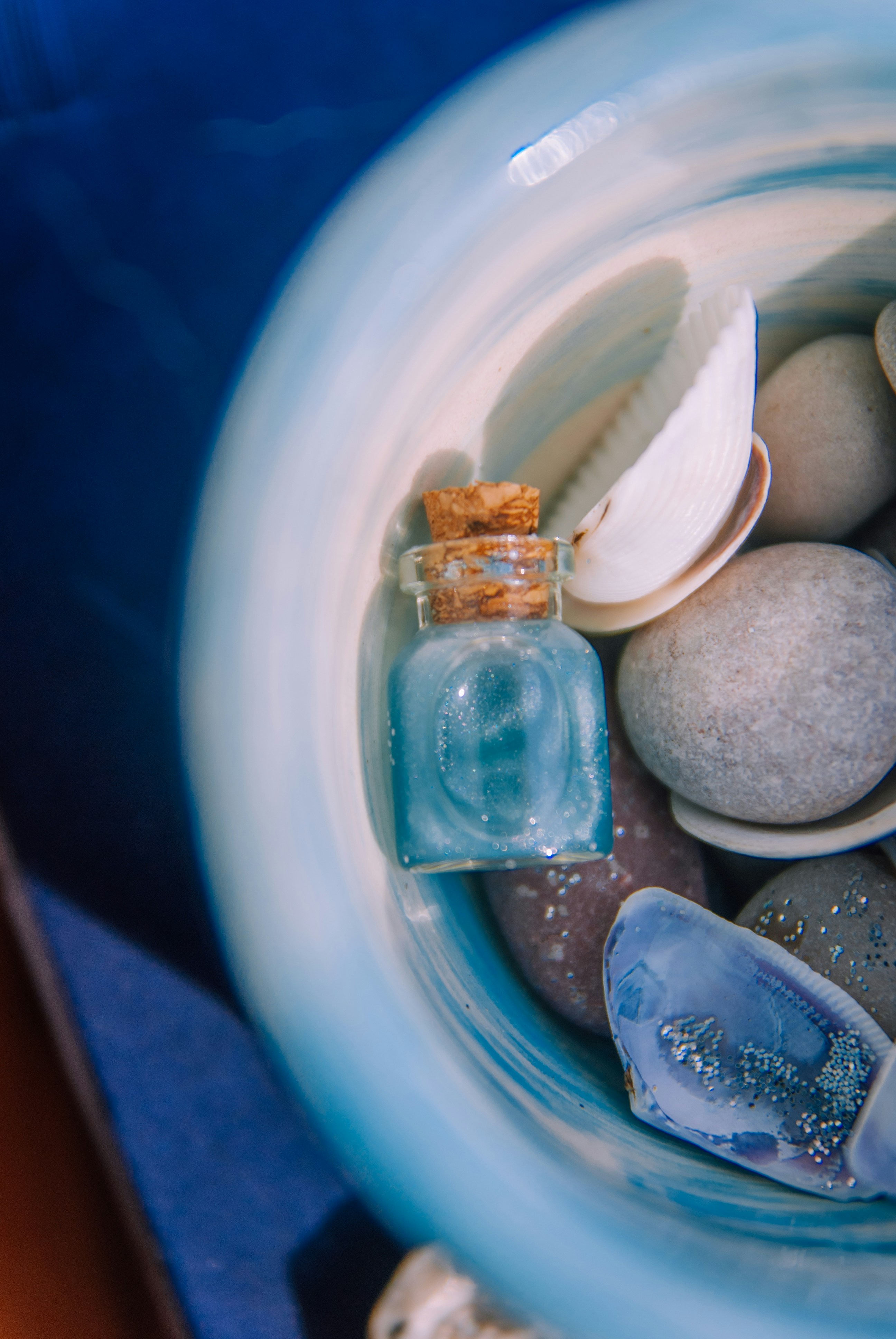 Tiny Blue Flask Among Beach Treasures