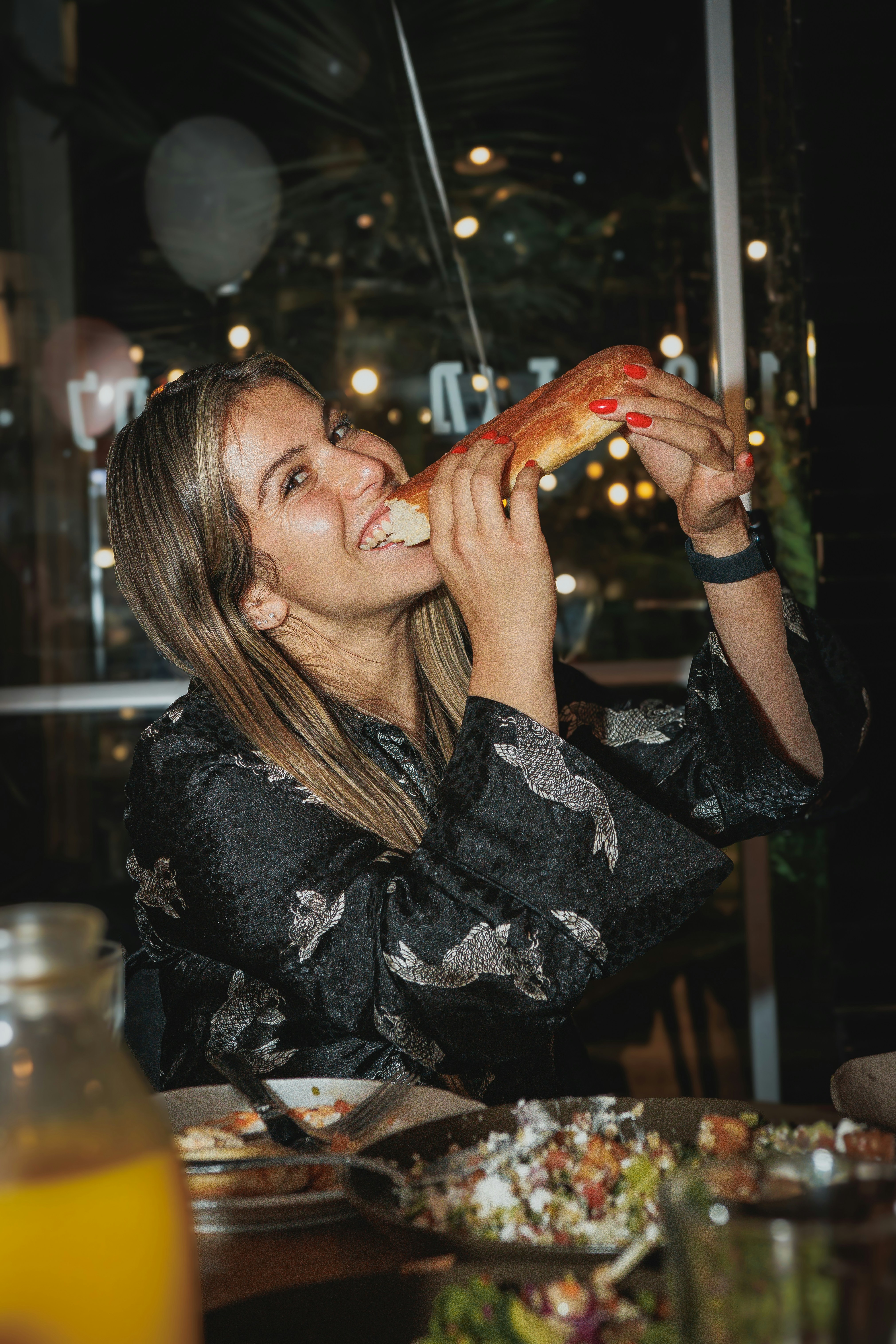 Bread Bite Beneath Warm Glass: A Night-Out Moment