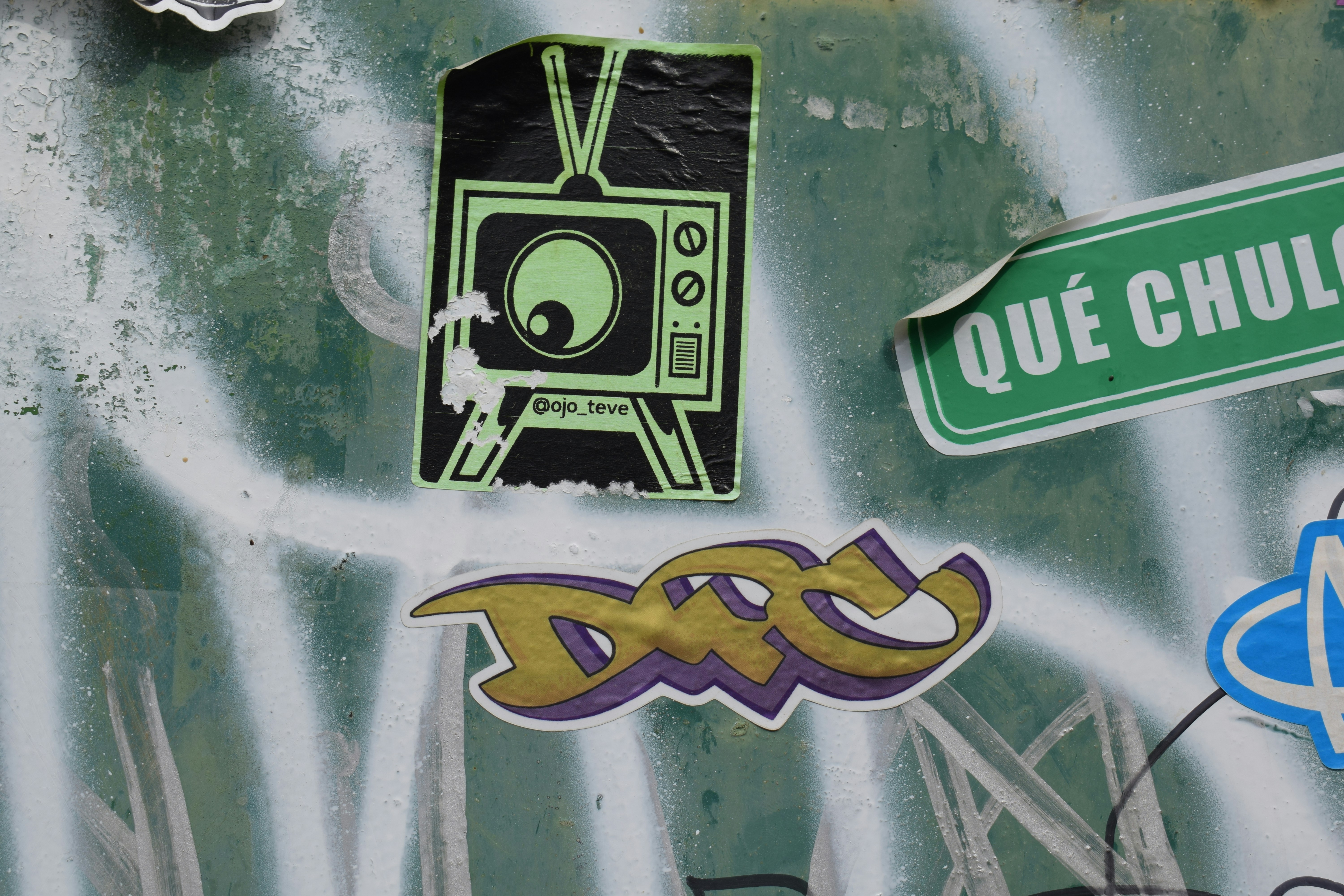 Retro TV Sticker Anchors a Graffiti Mosaic