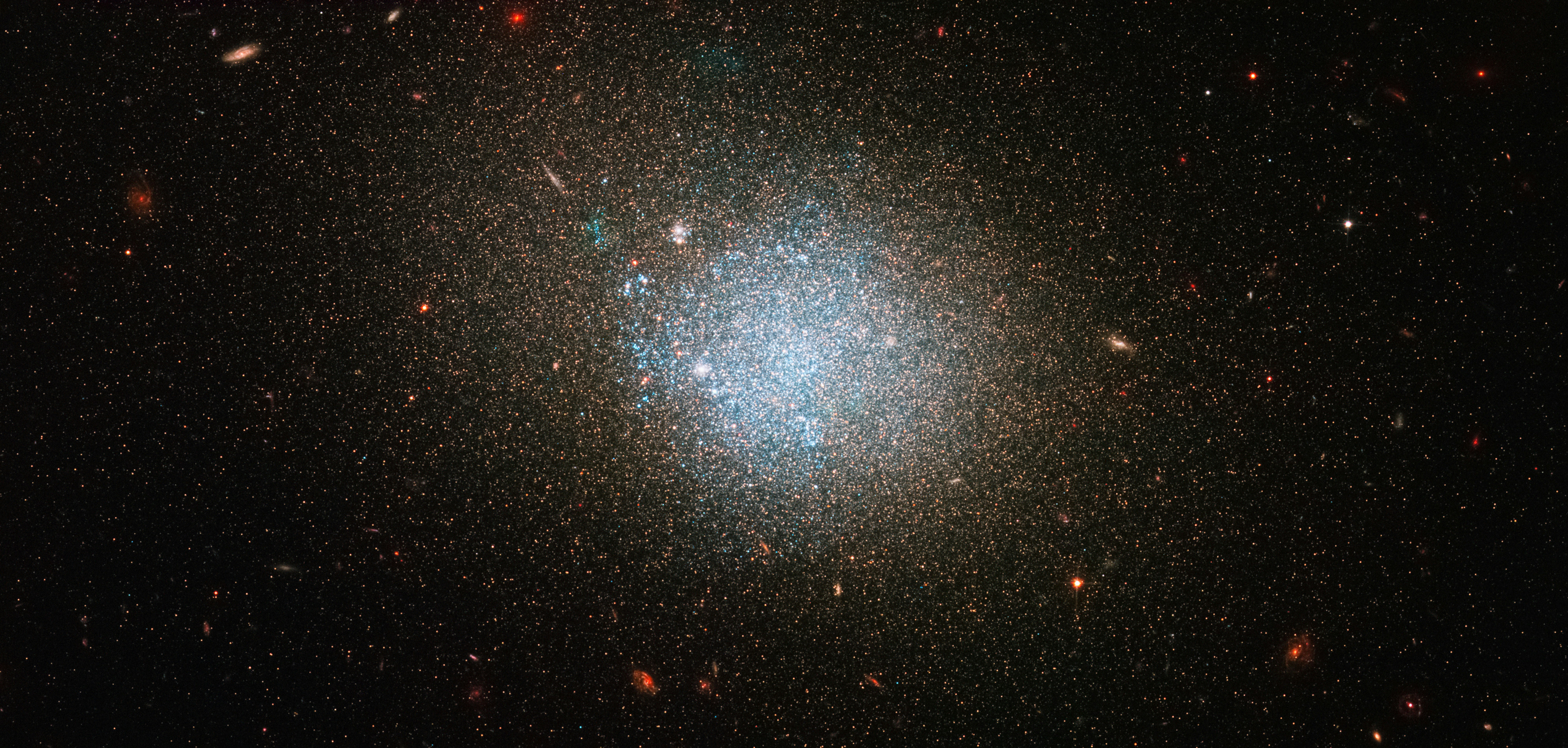 A bright blue object in the middle of a dark sky photo – Free Outer ...