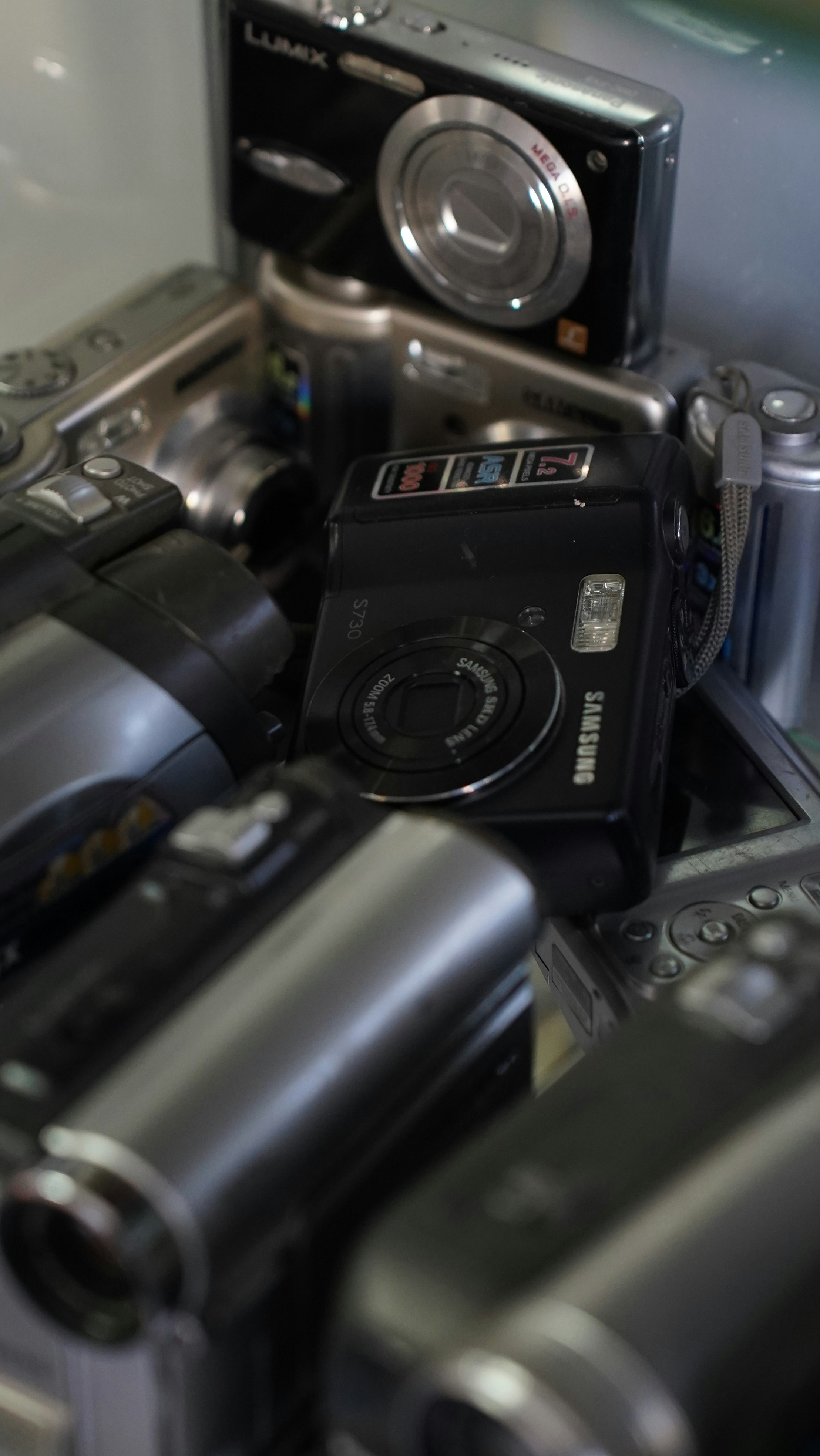 A group of cameras sitting on top of each other photo – Free Camera ...