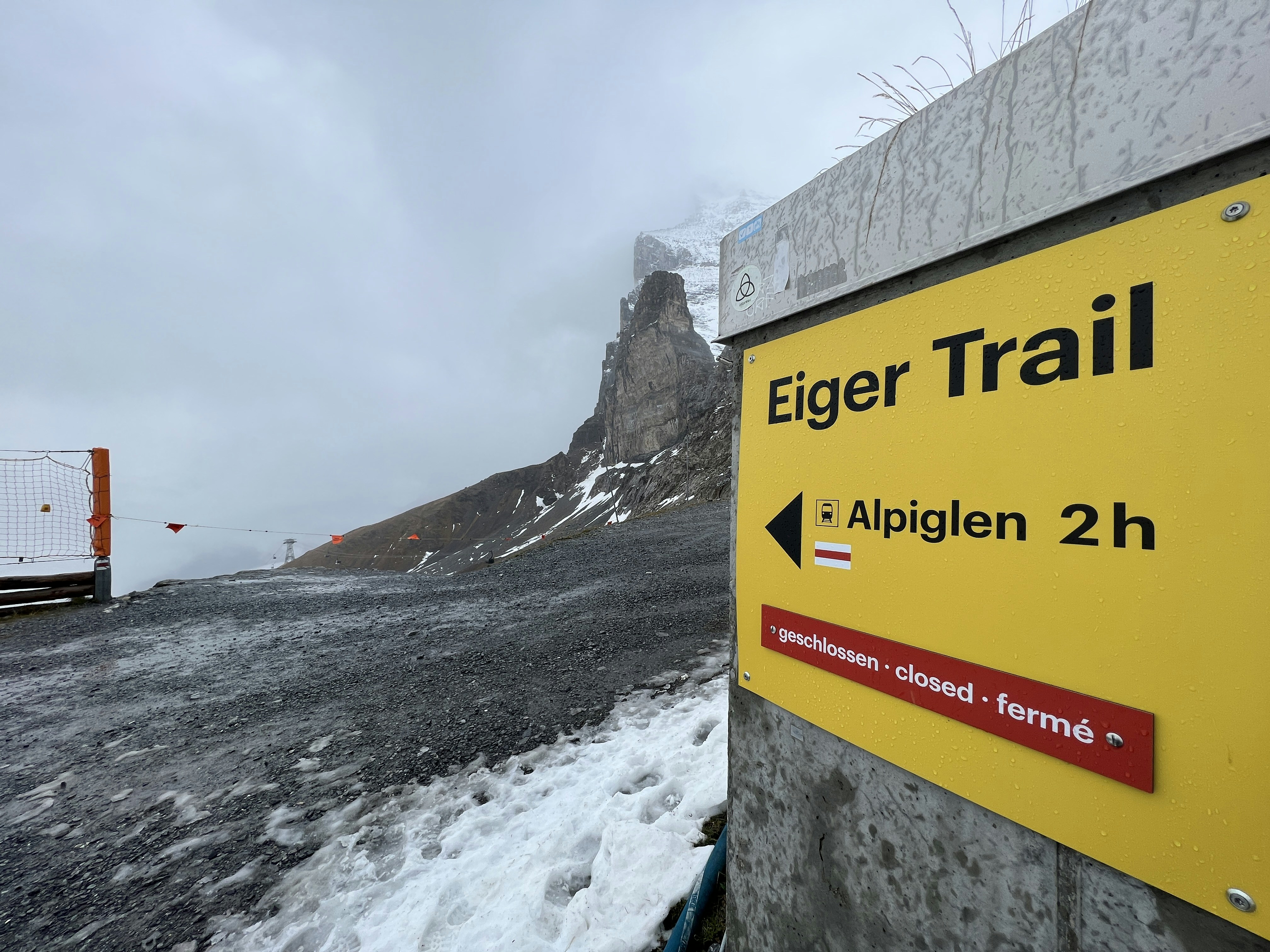 A sign on the side of a road that says eiger trail photo – Free ...